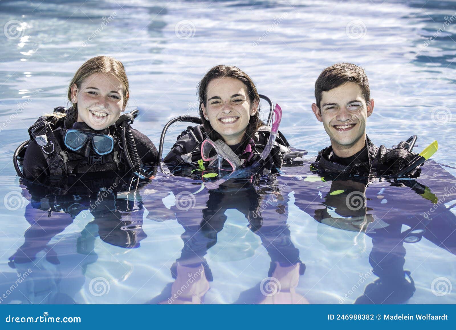 A Group of Happy Scuba Divers Standing in a Pool Stock Photo - Image of ...