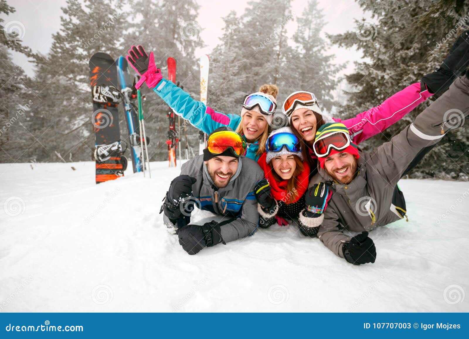Group of Skiers Lying on Snow and Having Fun Stock Image - Image of ...