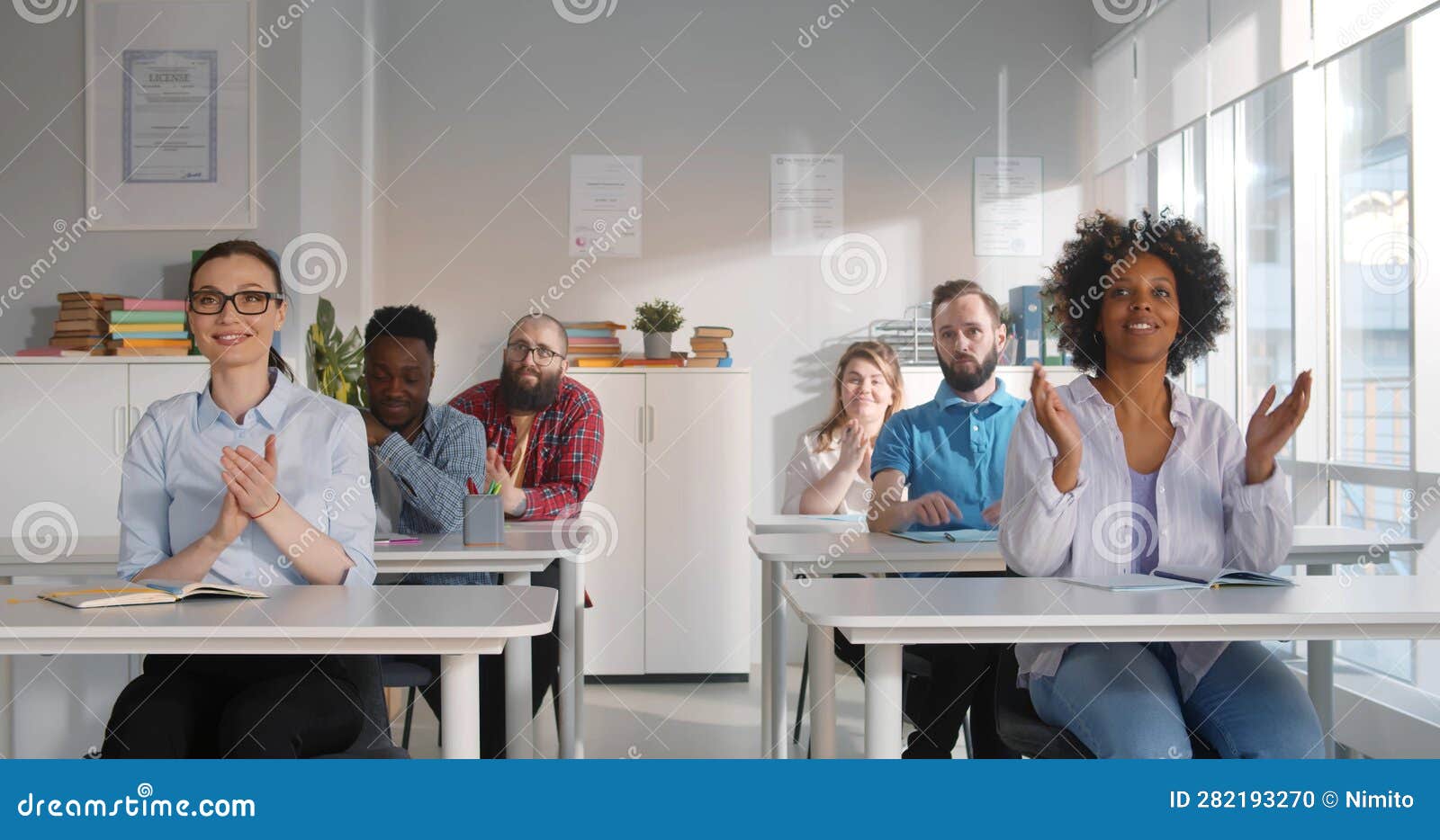 Group of Happy Students Applauding To Lecturer while Attending Class at ...