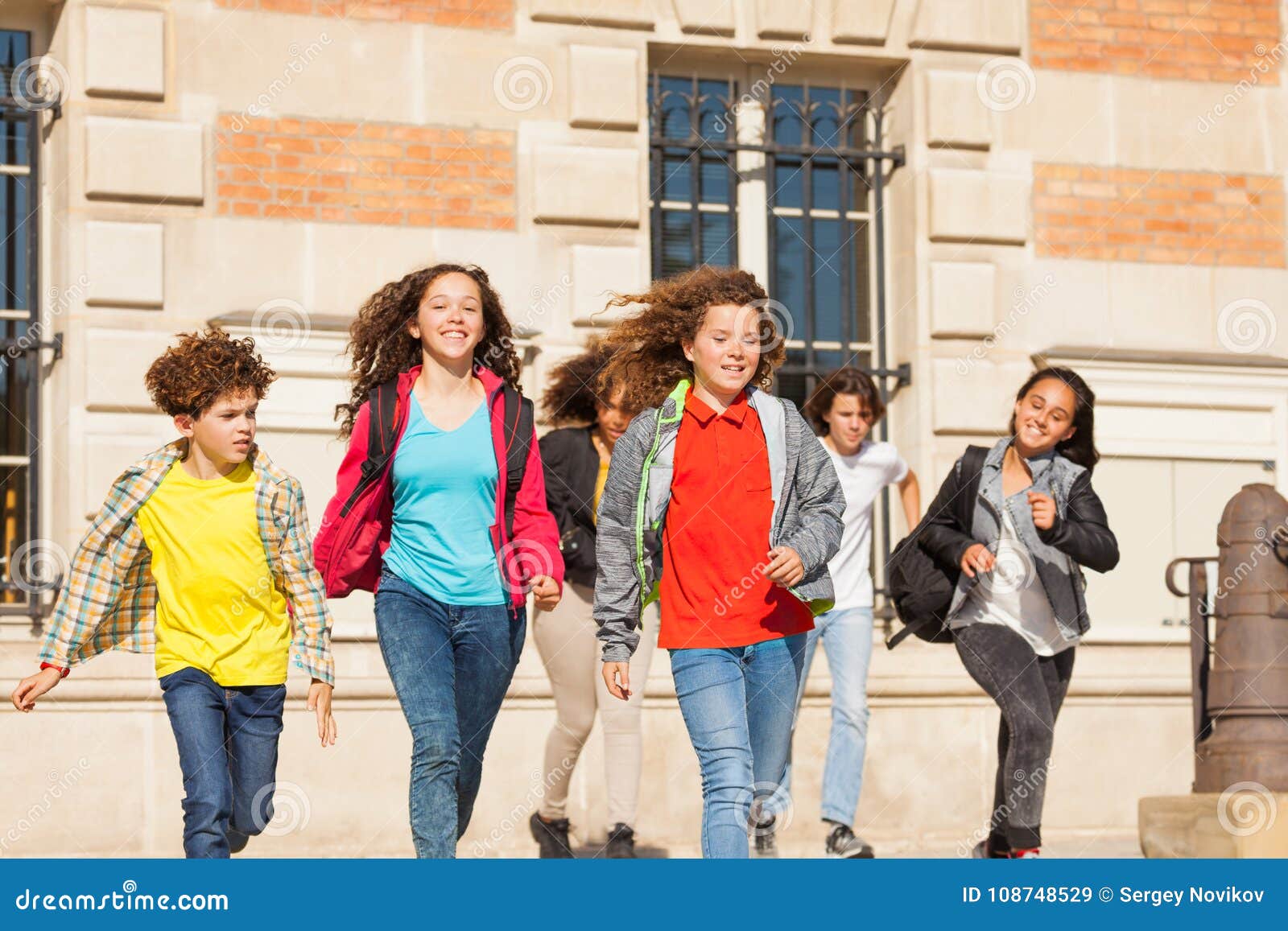 Happy Students with Backpacks Running Outdoors Stock Image - Image of ...