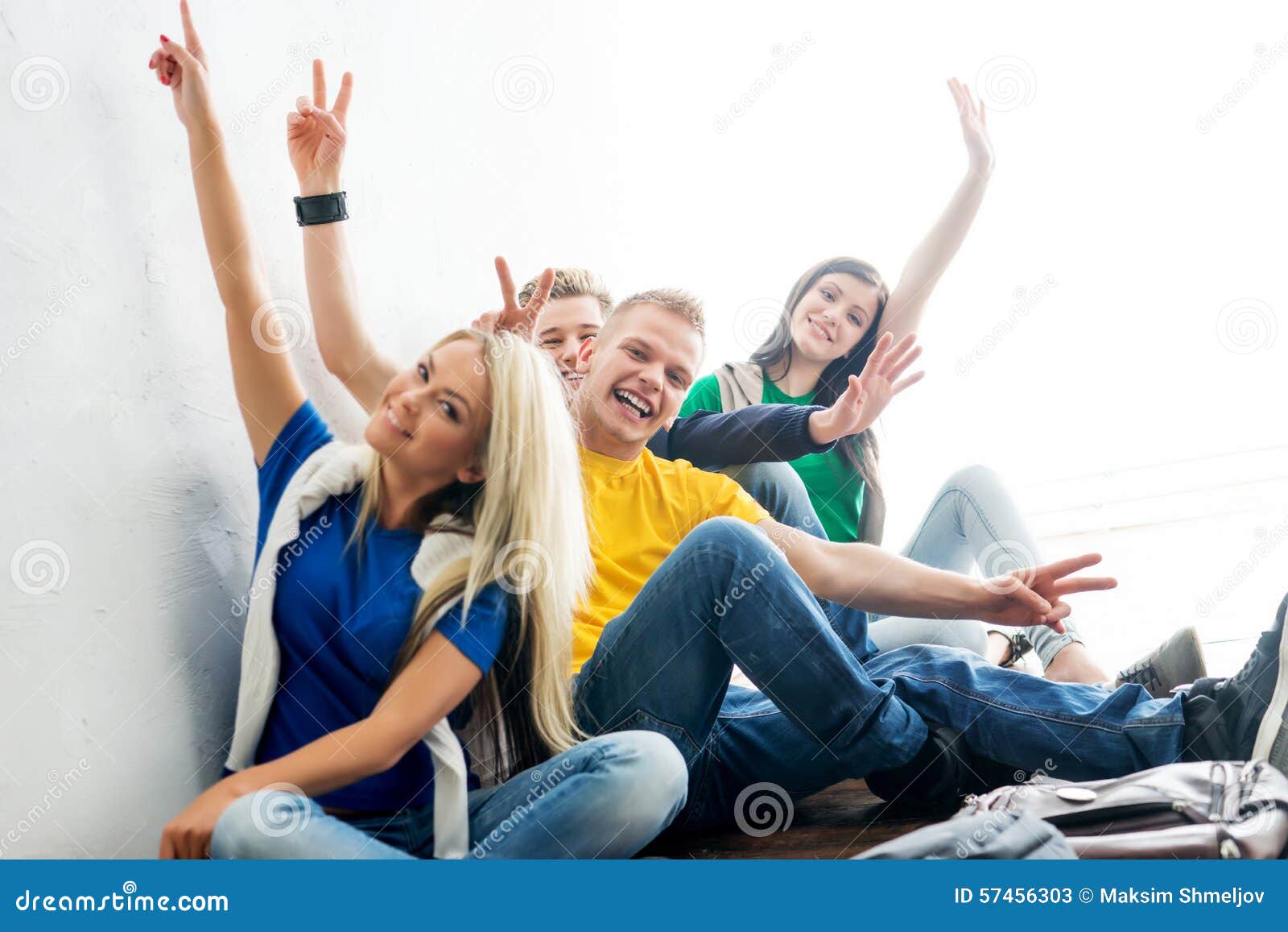 Group of Happy Students on a Break Waving Stock Image - Image of ...