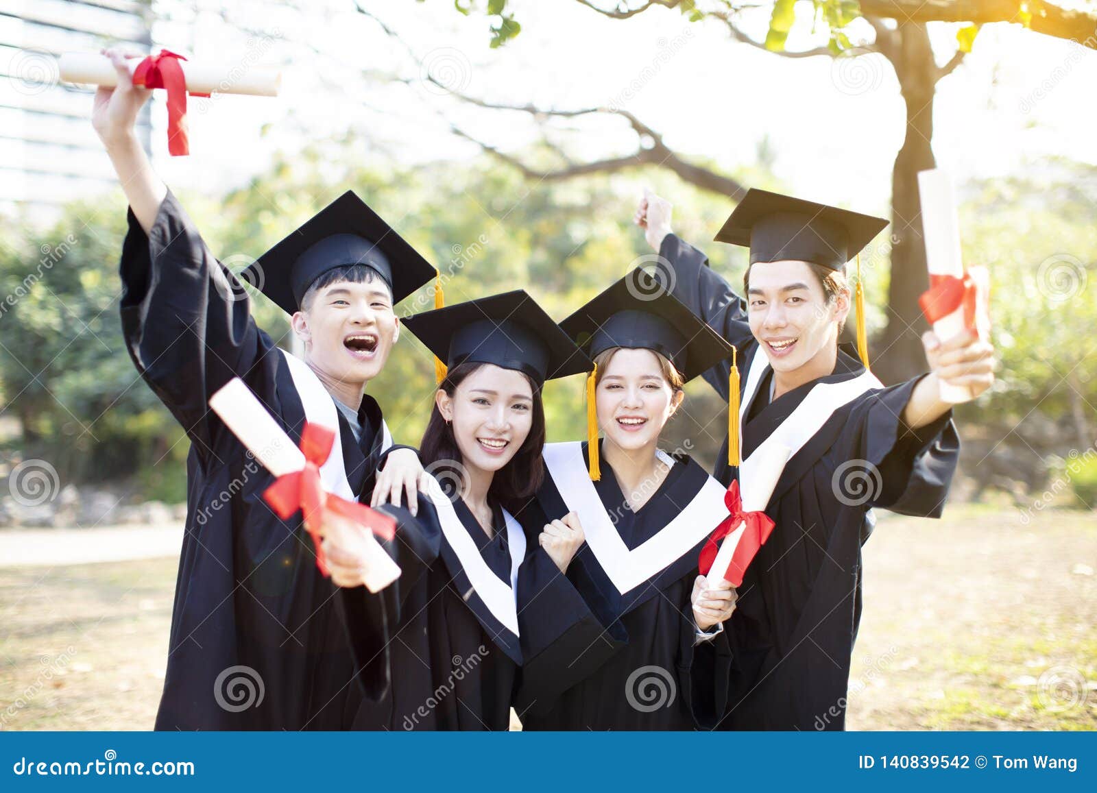 Group of Happy Students Celebrating Graduation Stock Photo - Image of ...