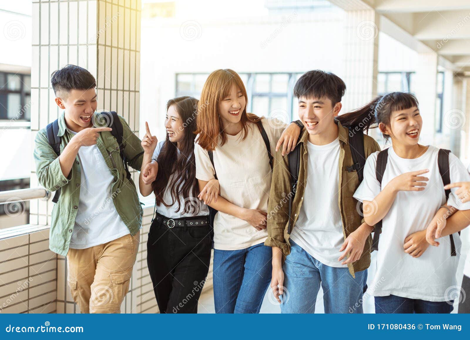Group of Happy Students Walking Along the Corridor at College Stock ...