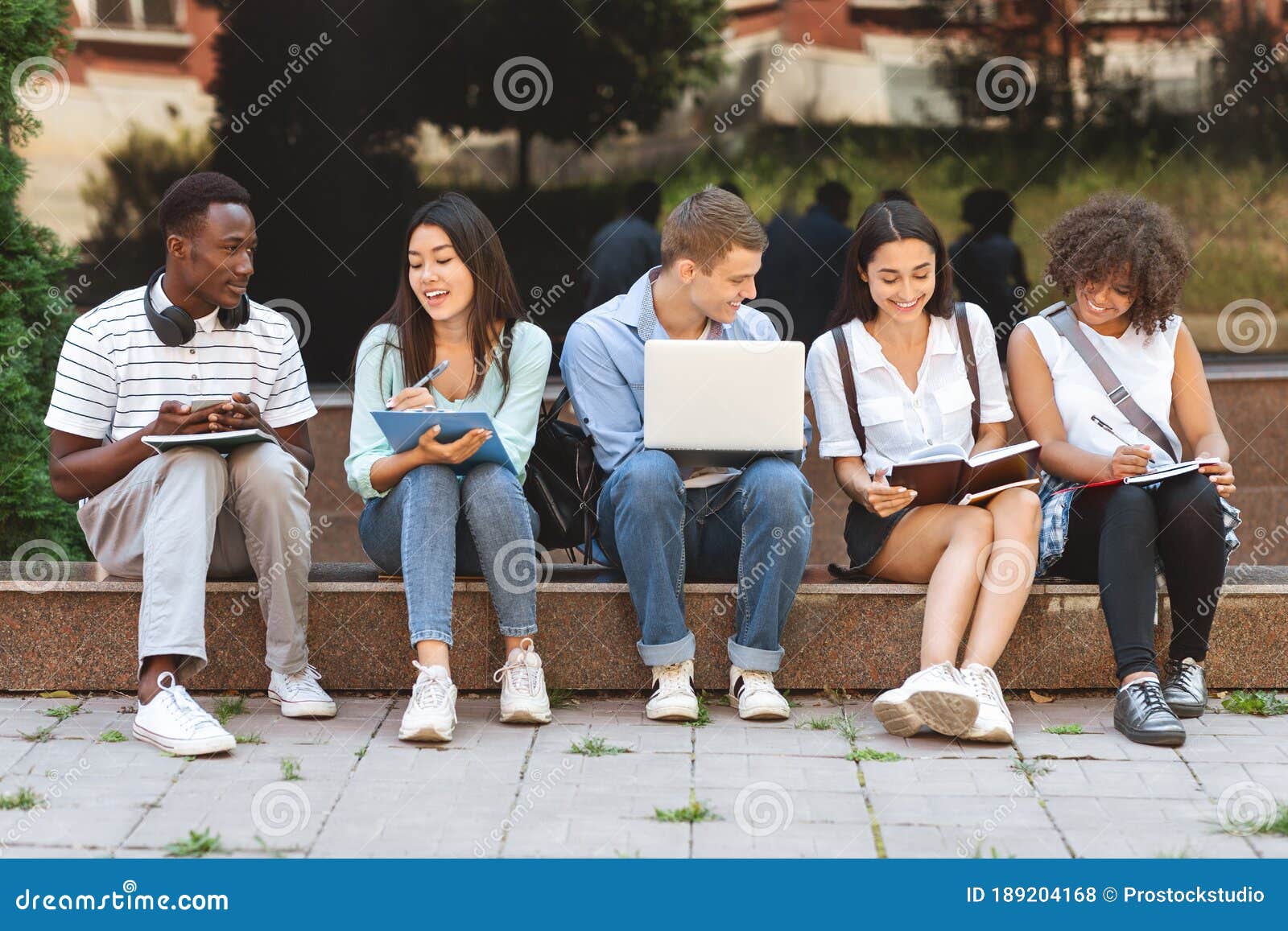 Group of Happy Teen High School Students Studying Outdoors Stock Photo ... Group of Happy Teen High School Students Studying Outdoors Stock Photo ...