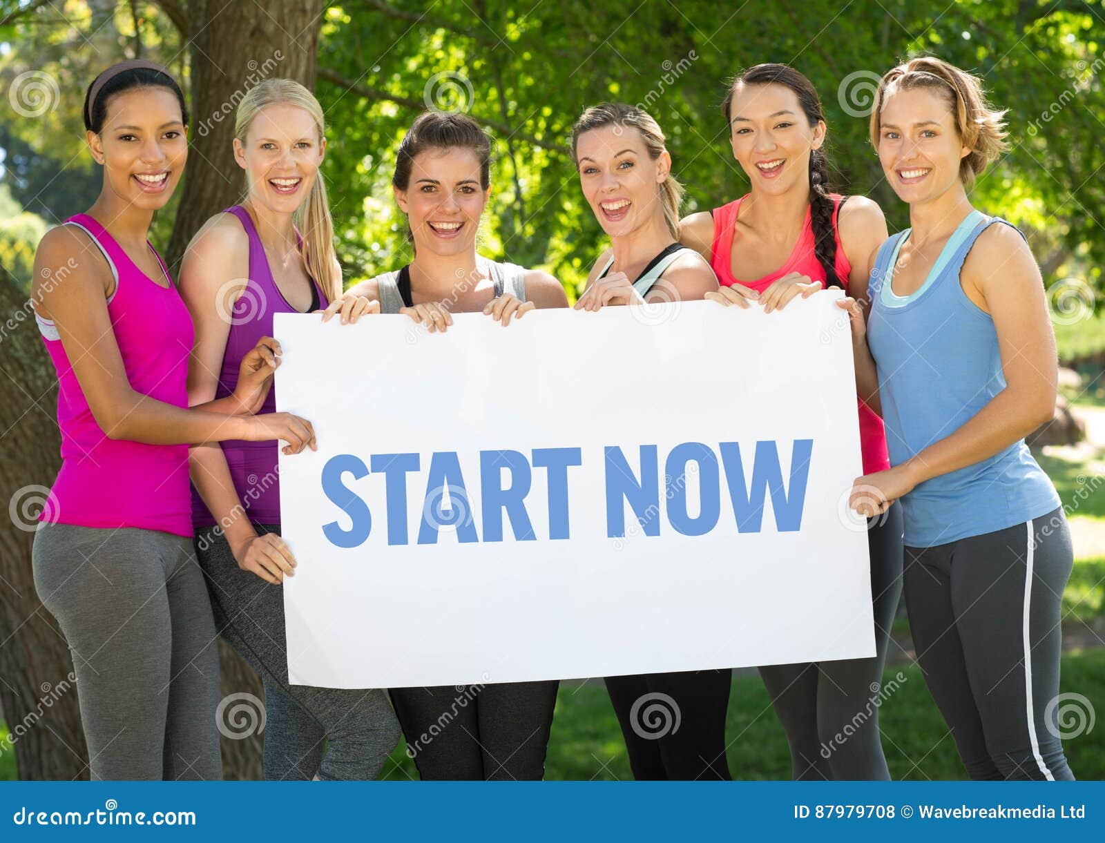 Group of Happy Women Holding Placard with Text Start Now Stock Photo ...