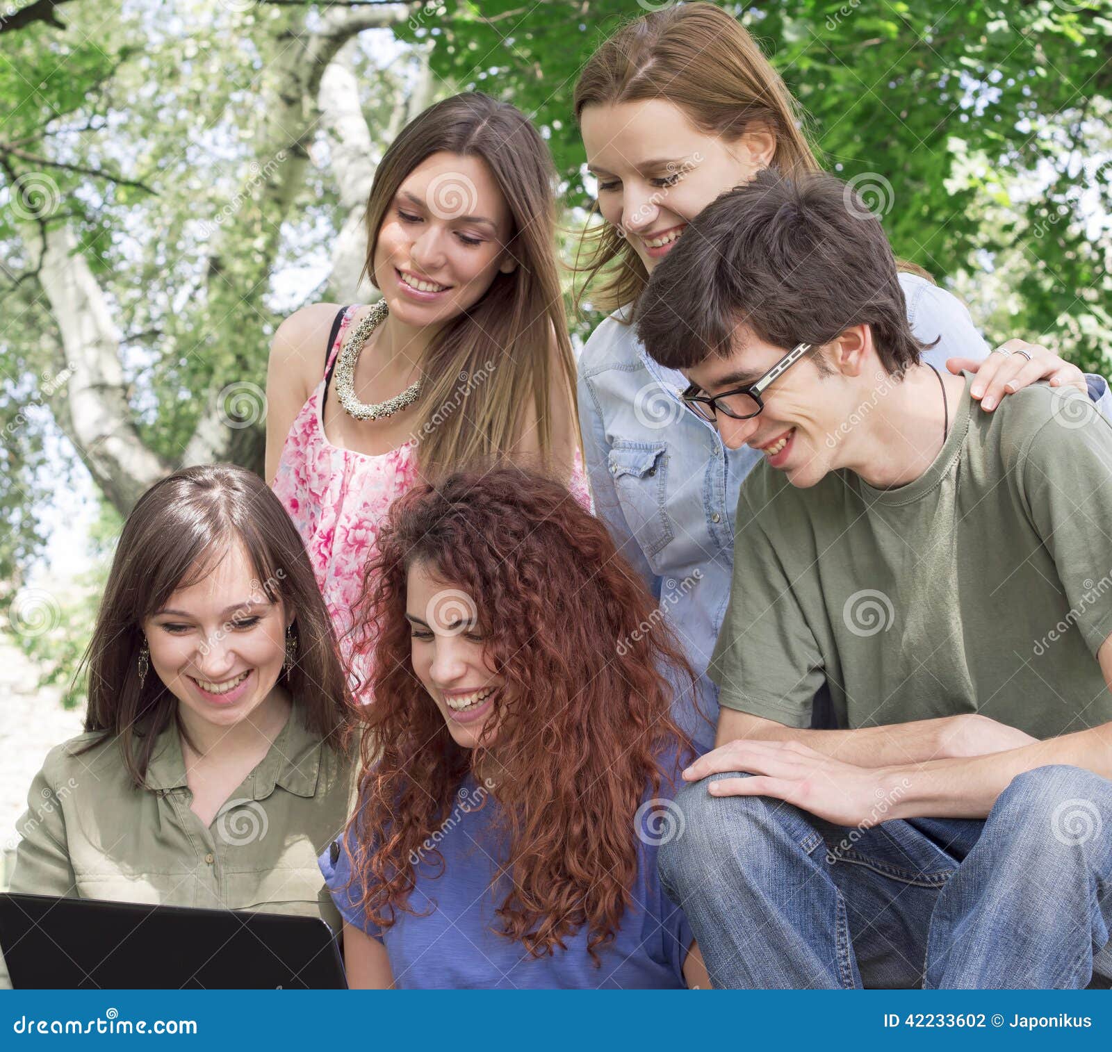Group of Happy Young College Students with Laptop Stock Photo - Image ...