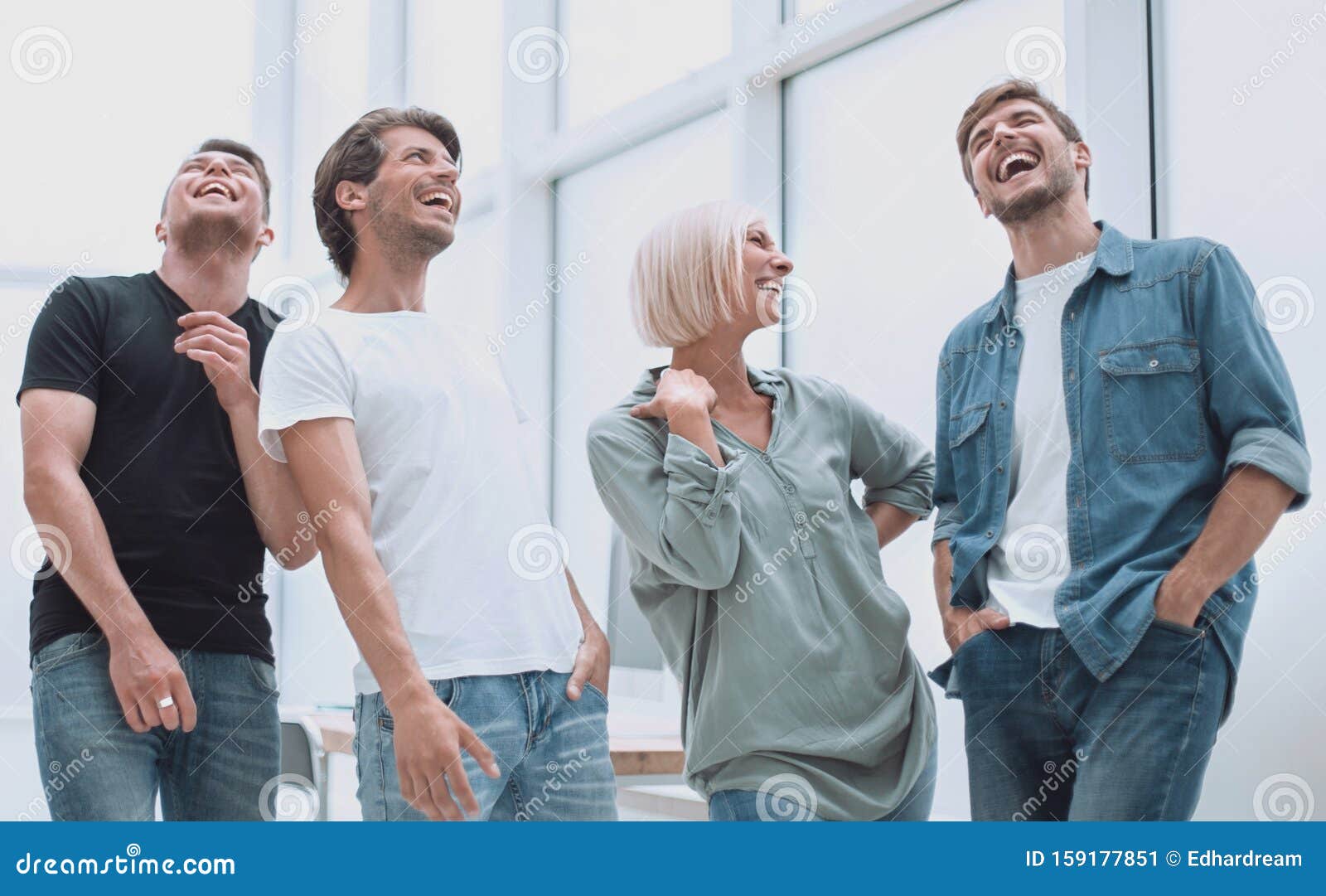 Group of Happy Young Employees Standing in the Office Stock Image ... Group of Happy Young Employees Standing in the Office Stock Image ...