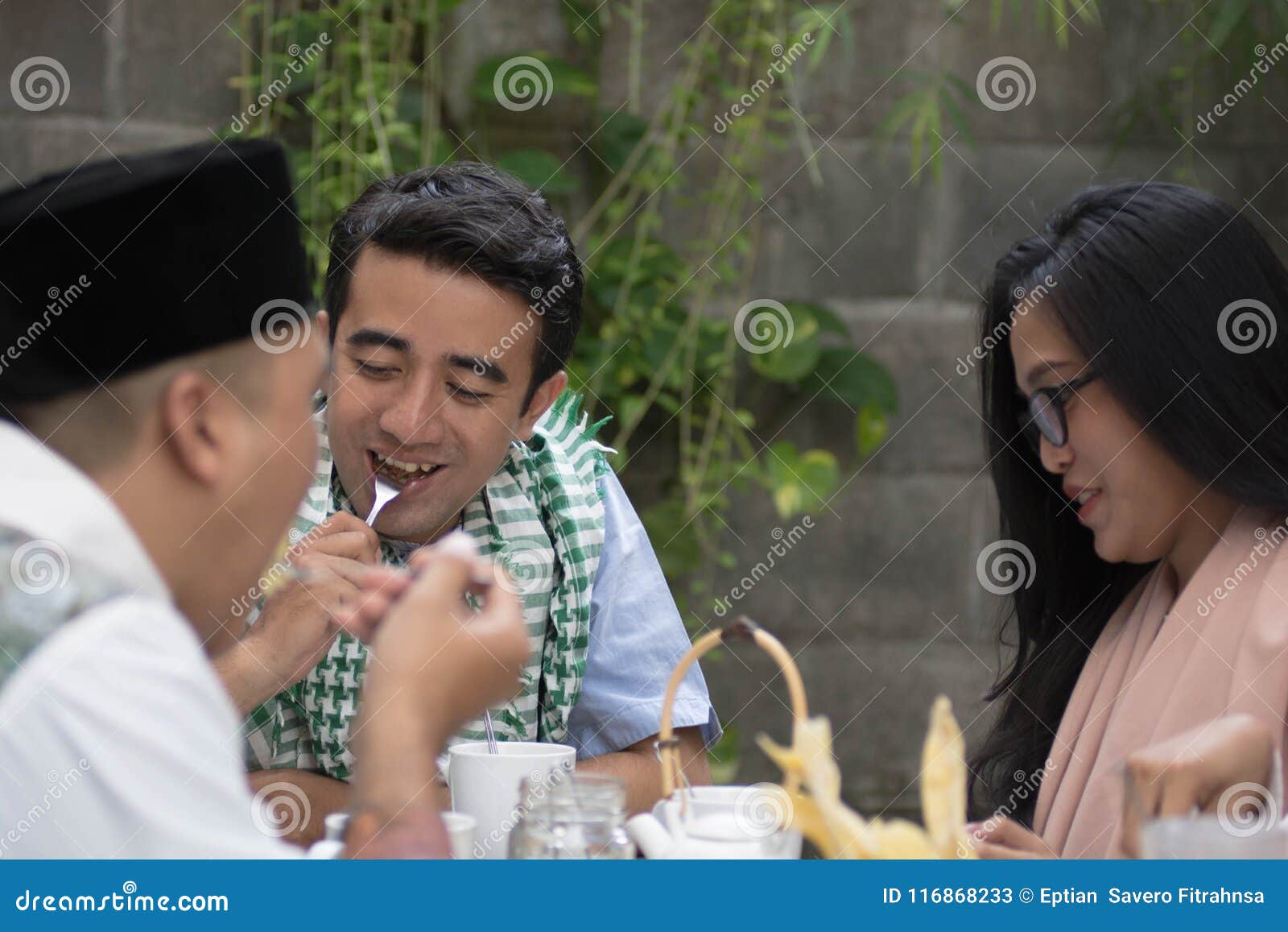 Group of Happy Young Muslim Having Dinner Outdoor during Ramadan Stock ...