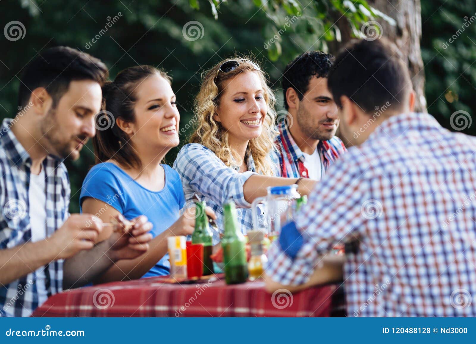 Group of Happy People Eating Food Outdoors Stock Photo - Image of home ...