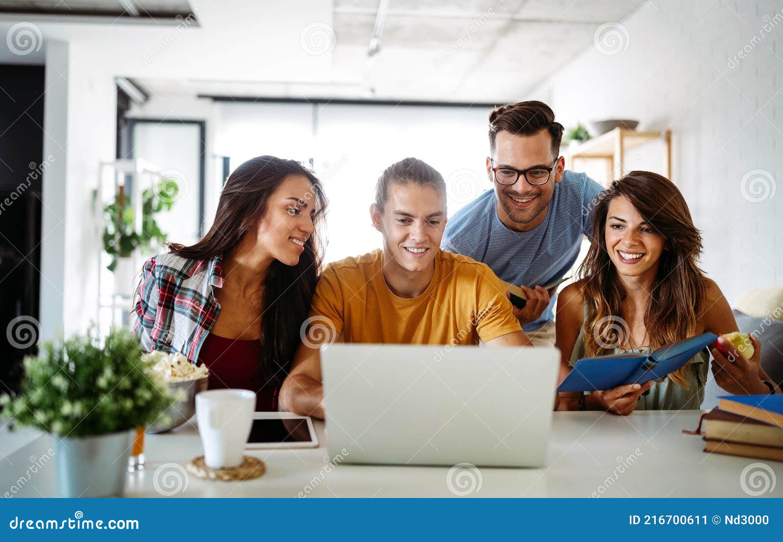 Group of Happy Young Students Having Fun while Studying Together for ...