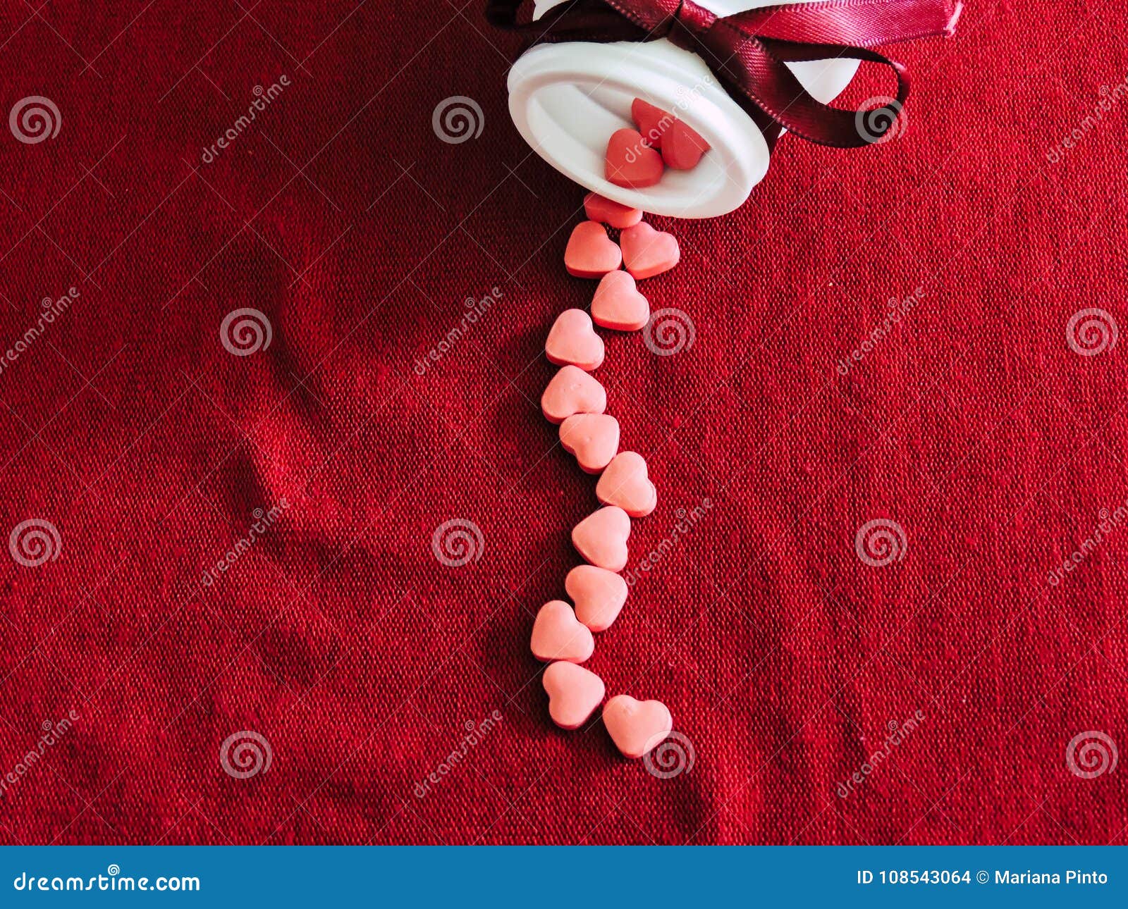 Group of Hearts Tablets on Red Cloth Background. Valentines Day Stock ...