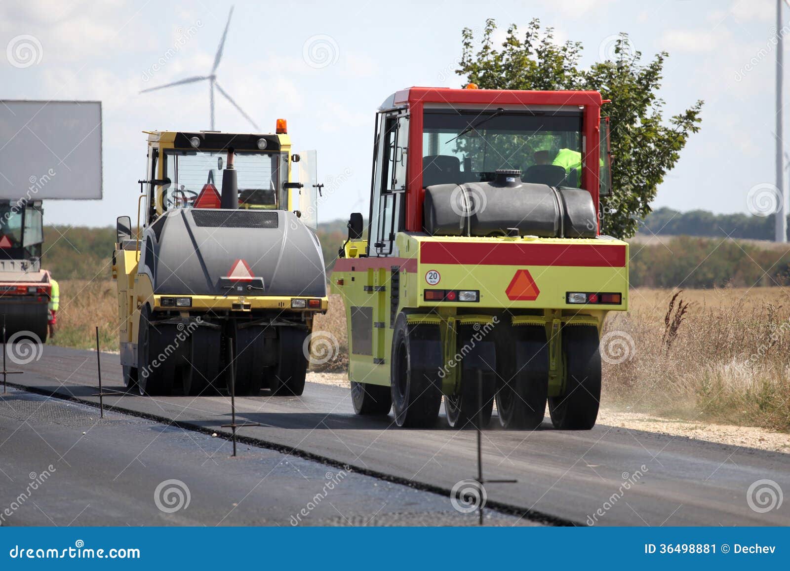 Heavy Vibration Yellow Steamroller Or Soil Compactor Working On Hot-mix ...