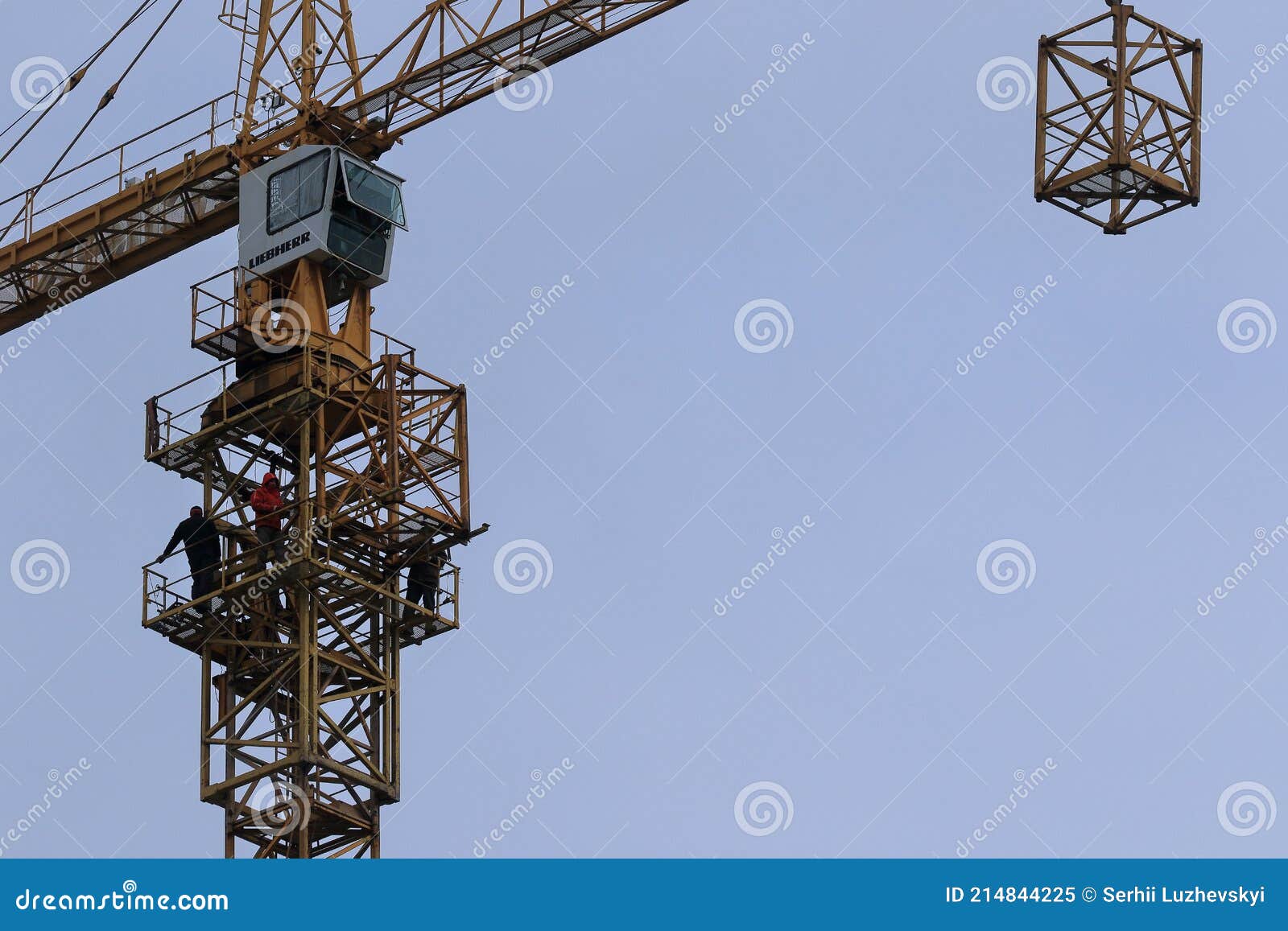 A Group of High-rise Assemblers Work on the Top Floor of a Construction ...