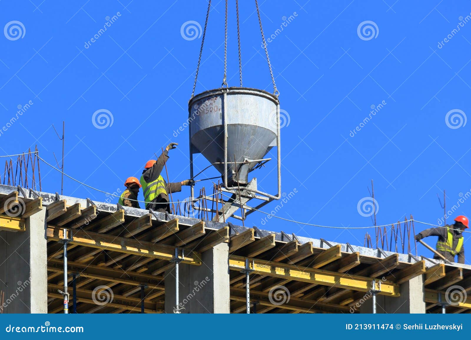 A Group of High-rise Assemblers Work on the Top Floor of a Construction ...