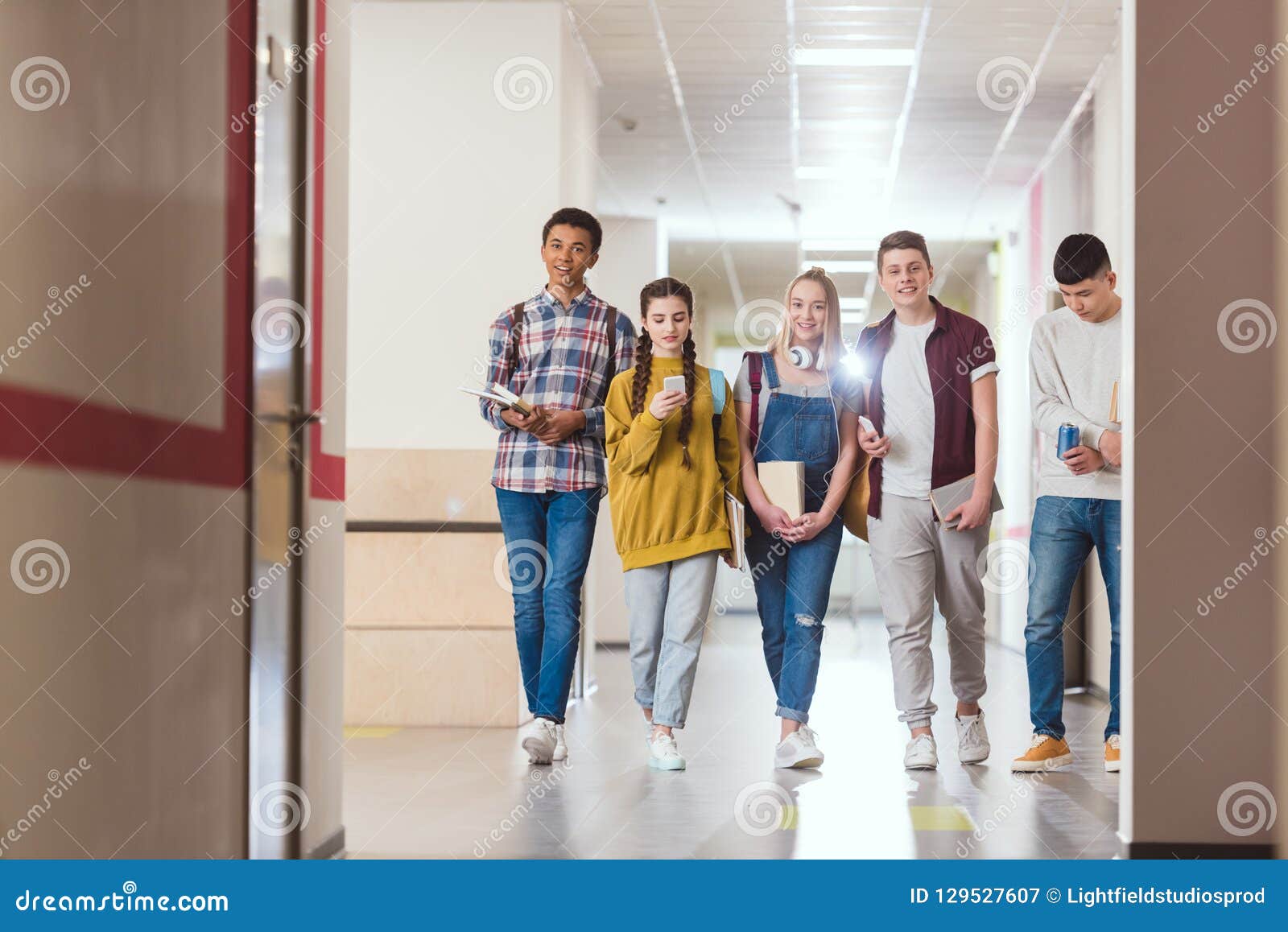 Group of High School Classmates Walking Stock Image - Image of friends ...