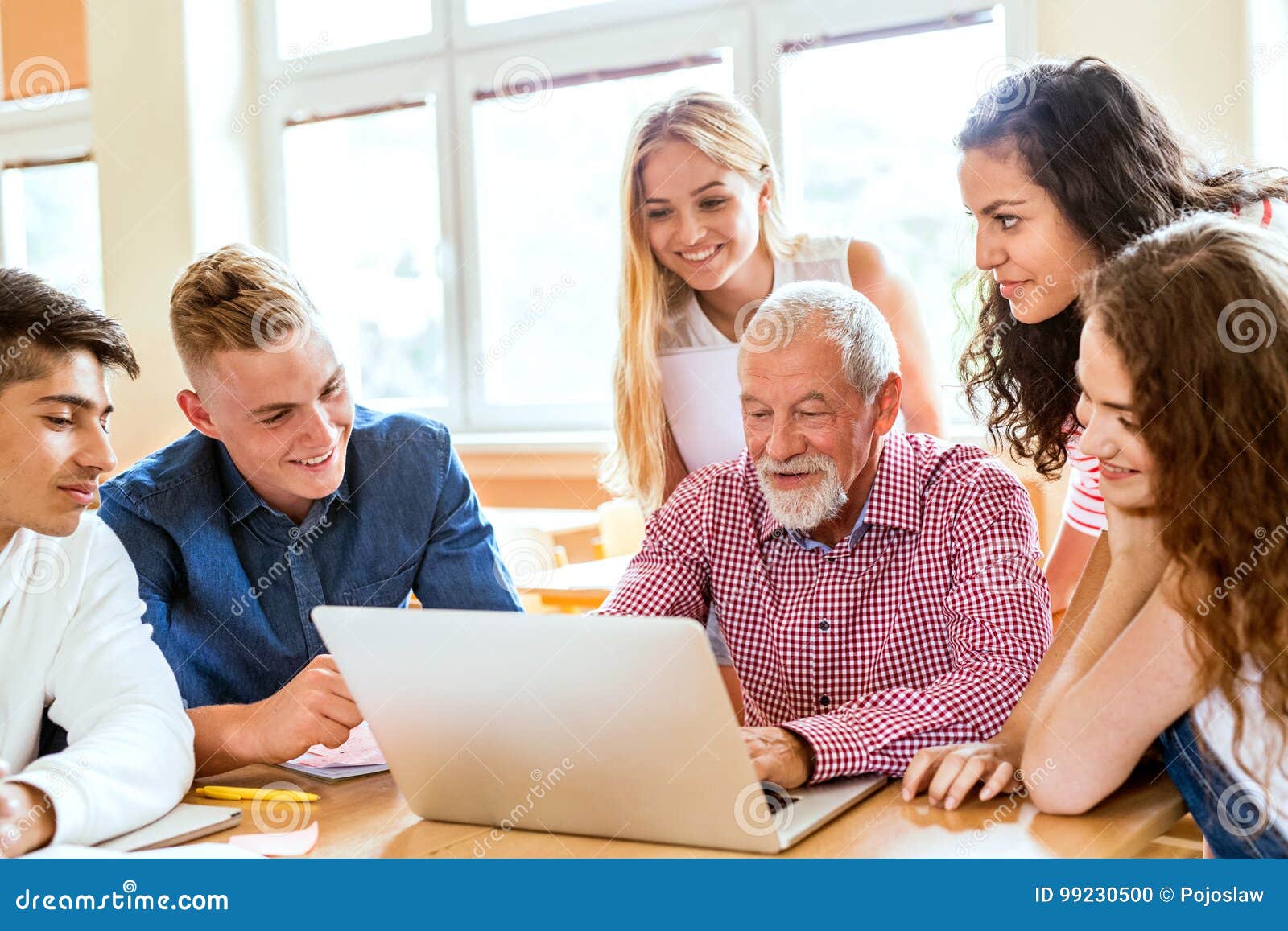 High School Students and Teacher with Laptop. Stock Photo - Image of ...
