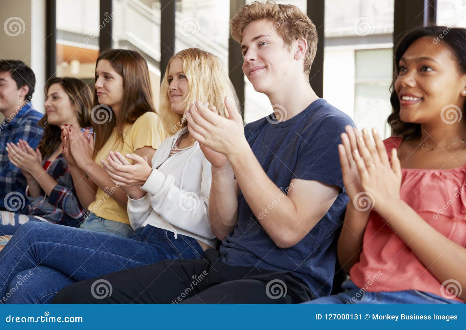 Students Appreciating Classmate After Presentation In Classroom Royalty ...