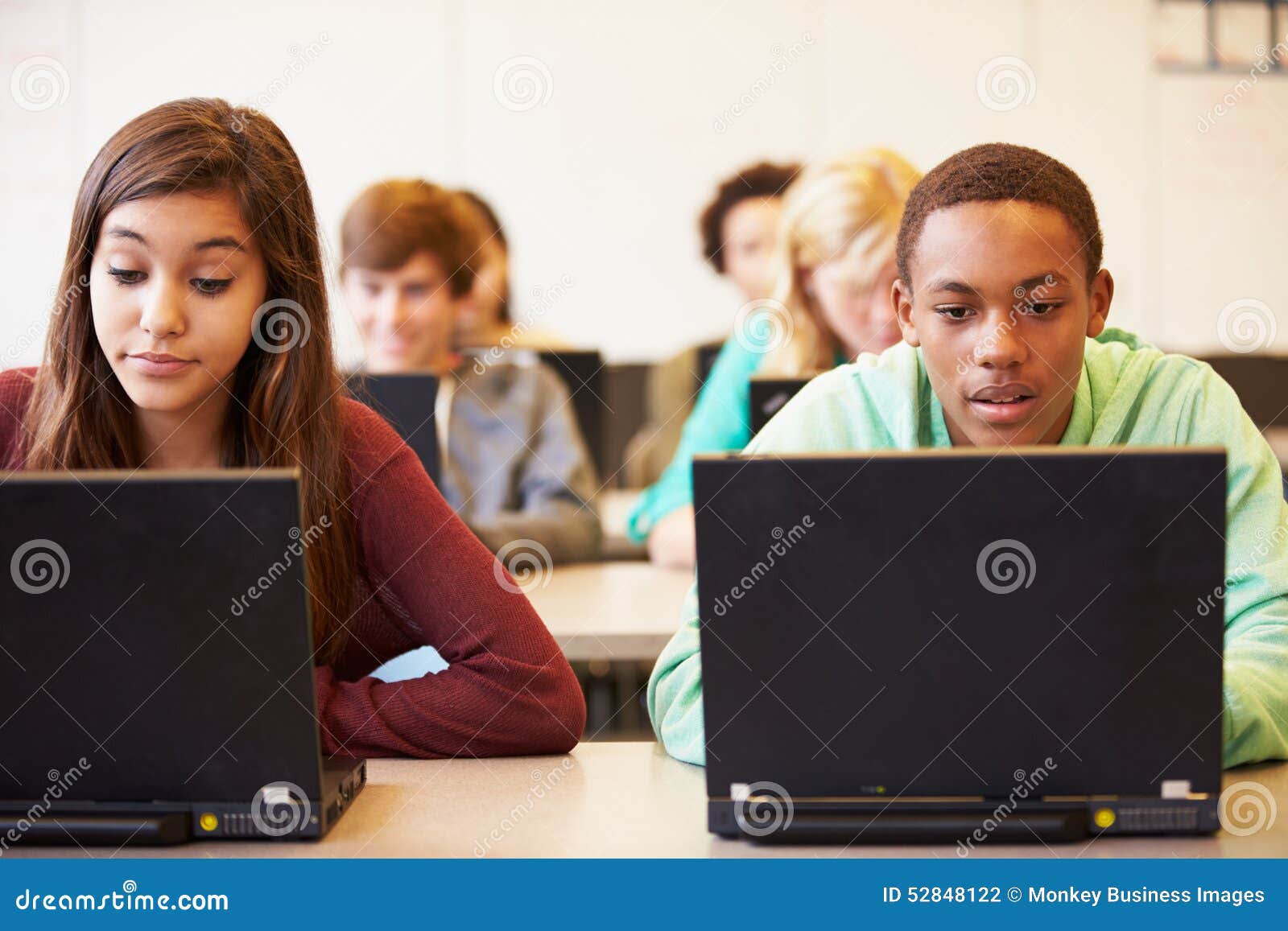 Group of High School Students in Class Using Laptops Stock Photo ...