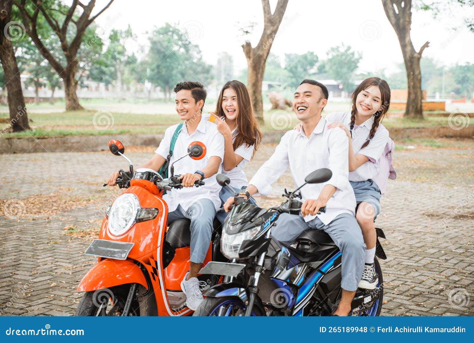 Group of High School Students Riding a Motorcycle without Helmet Stock Photo - Image of senior ...