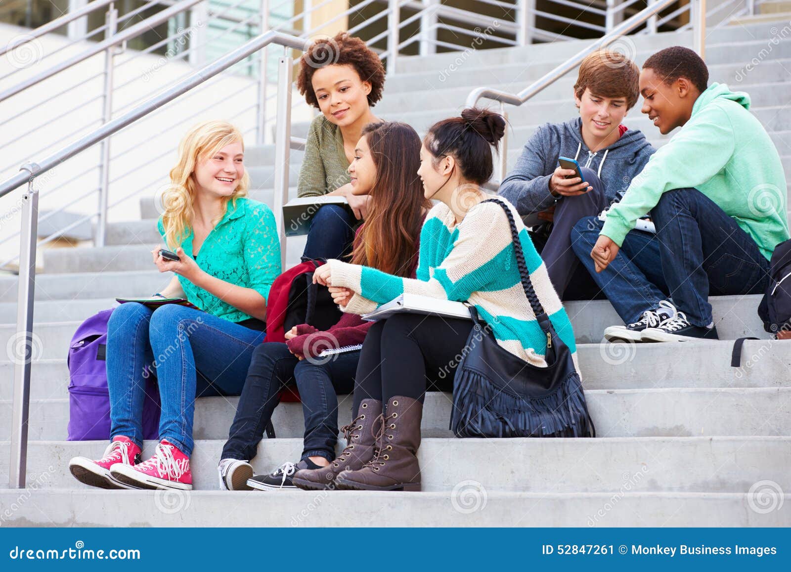 Group of High School Students Sitting Outside Building Stock Image ...