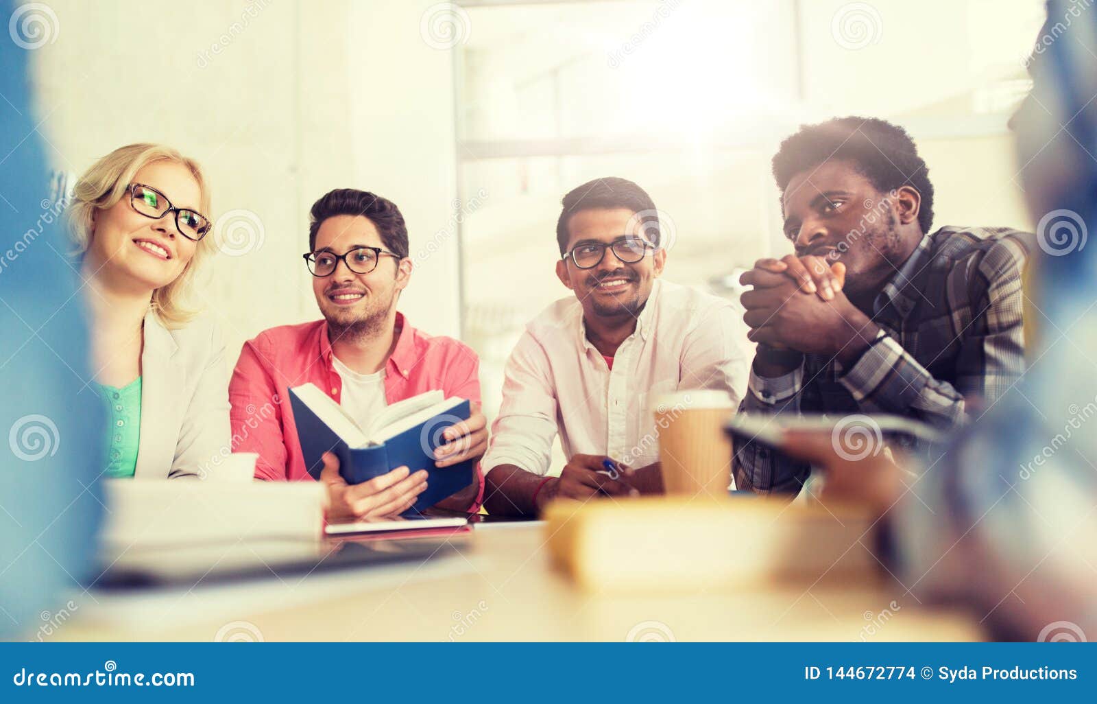 Group of High School Students Sitting at Table Stock Photo - Image of ...