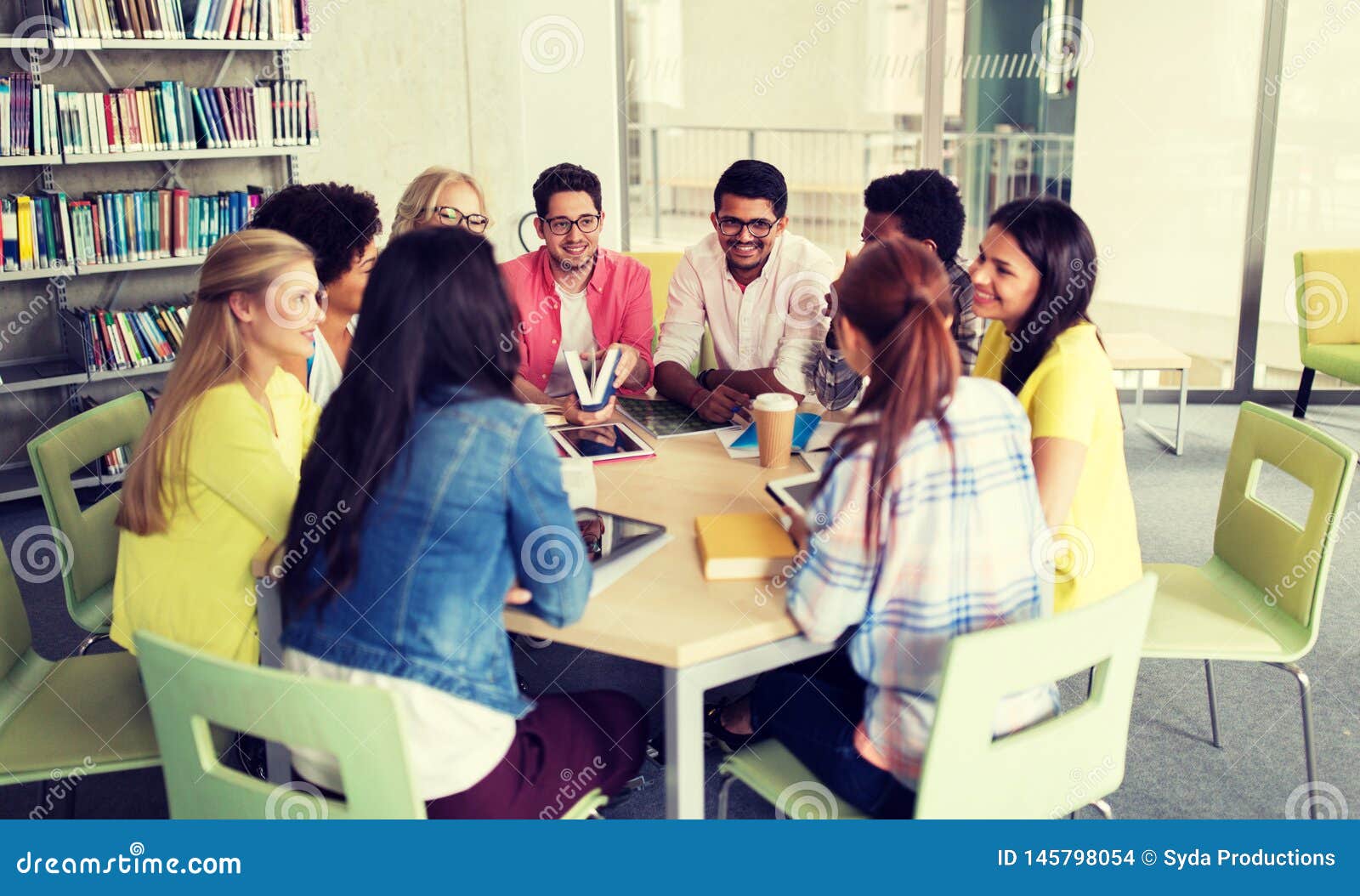 Group of High School Students Sitting at Table Stock Photo - Image of ...