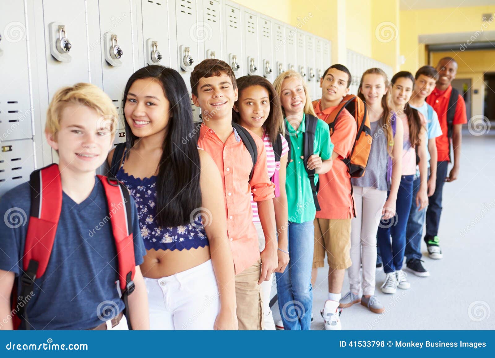 Group of High School Students Standing in Corridor Stock Photo - Image ...