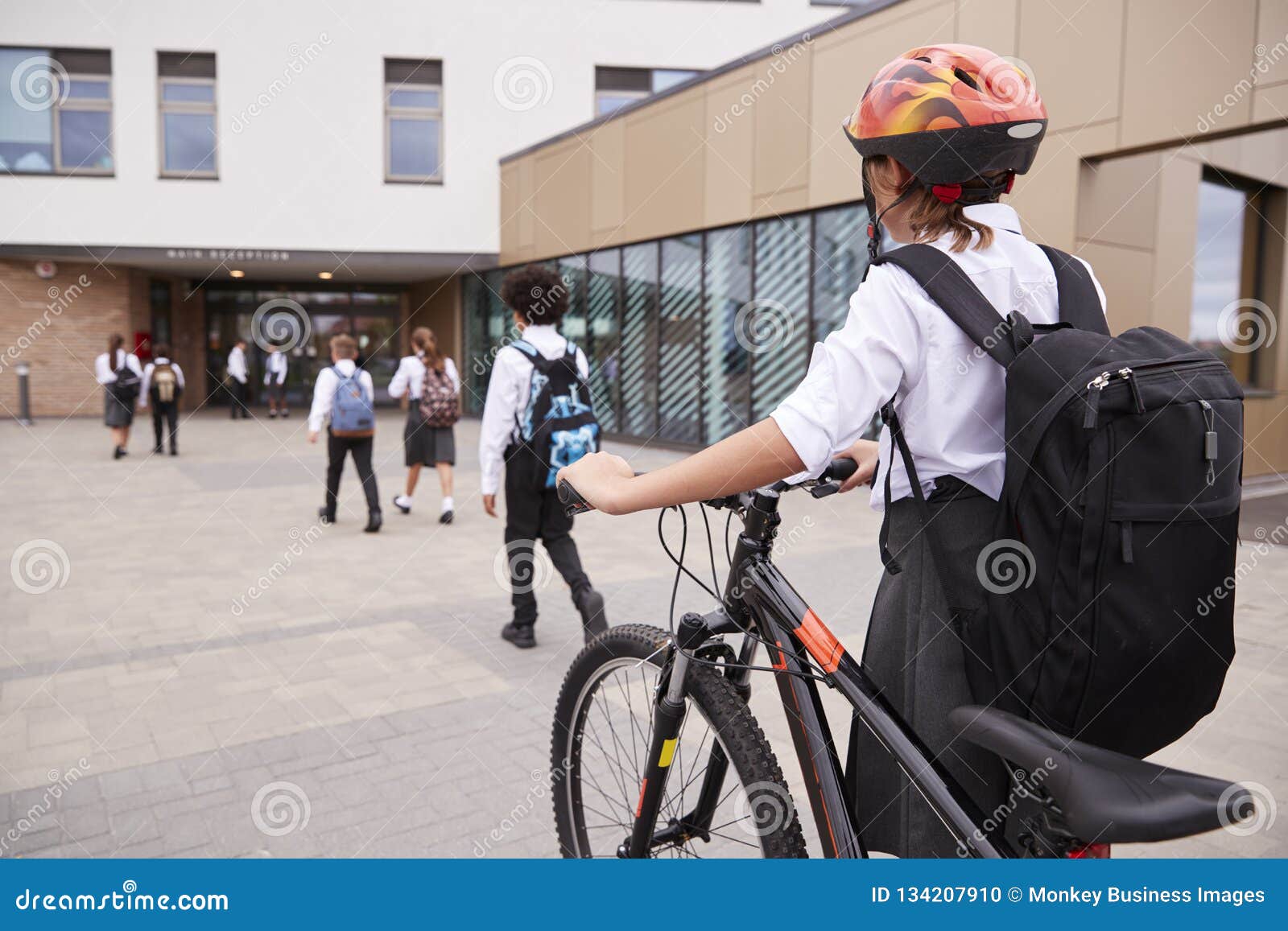 Group of High School Students Wearing Uniform Arriving at School ...