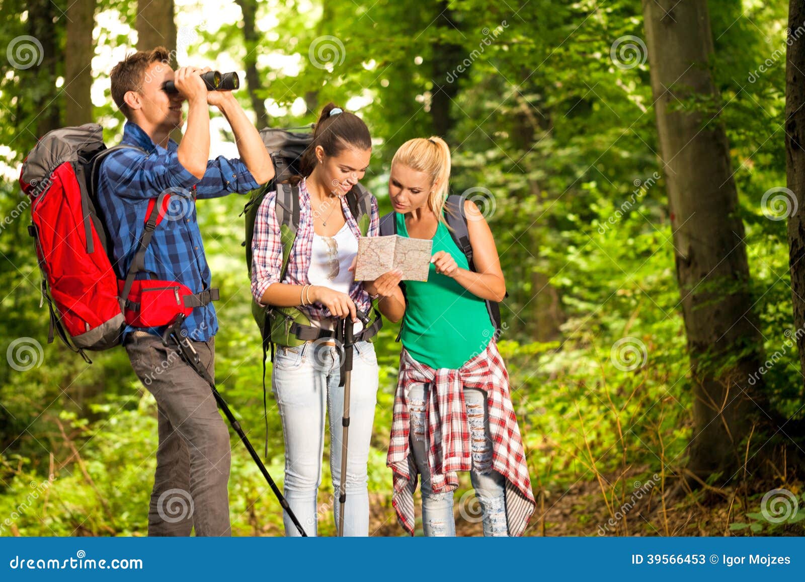 Group of Hikers with Map and Binoculars Stock Image - Image of ...