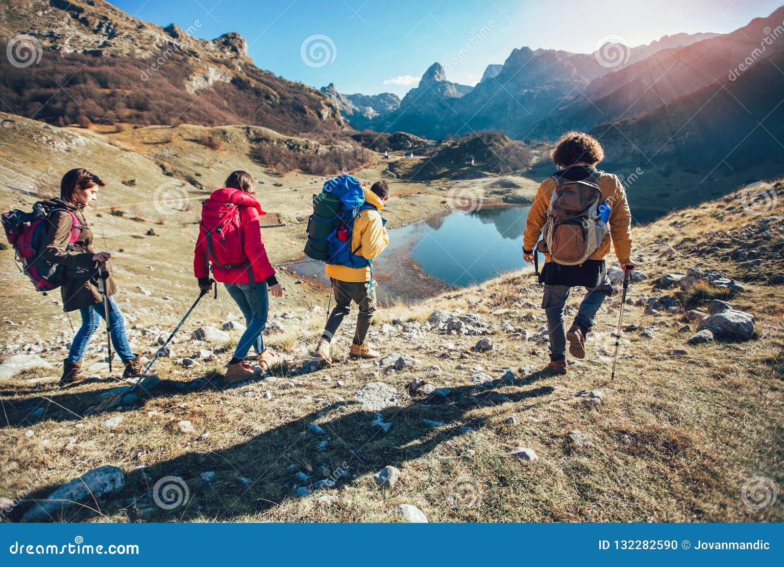 Group of Hikers Walking on a Mountain Stock Photo - Image of climbing ...