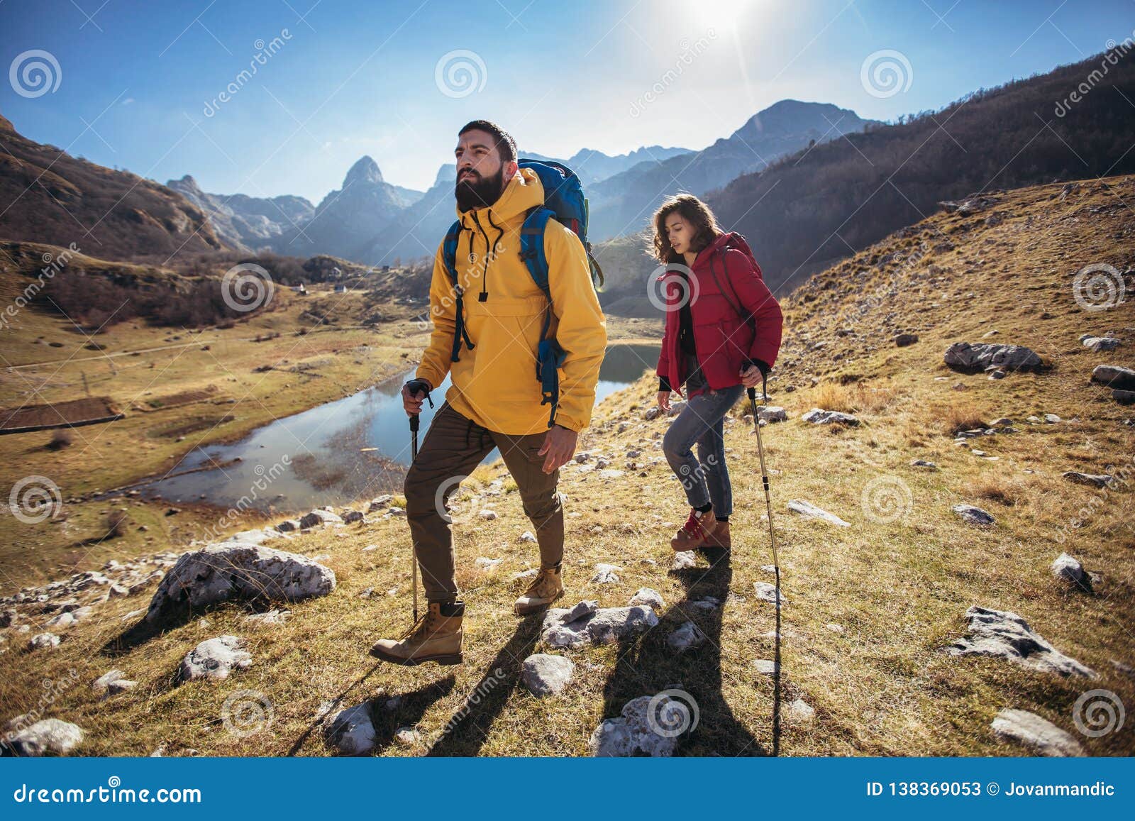 Group of Hikers Walking on a Mountain Stock Image - Image of crossing ...