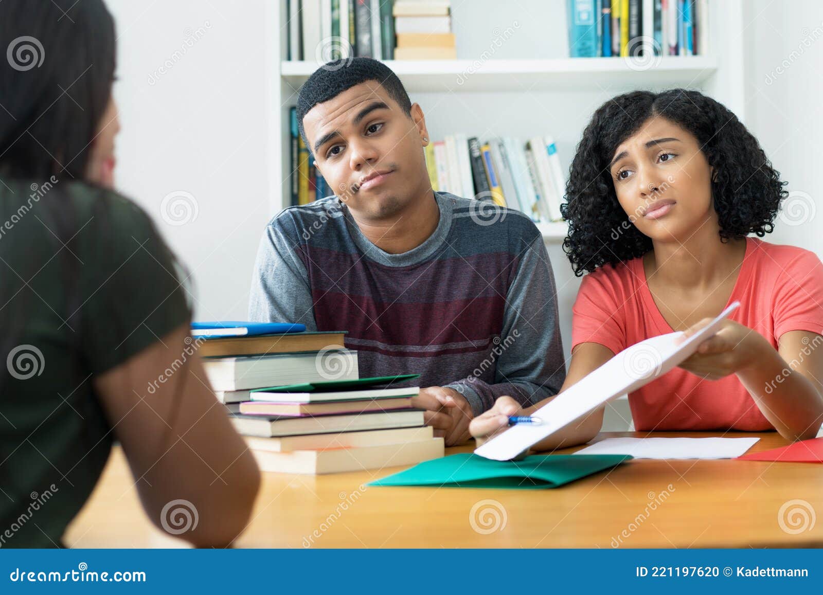 Group of Hispanic Male and Female Students Learning with Lazy Student ...