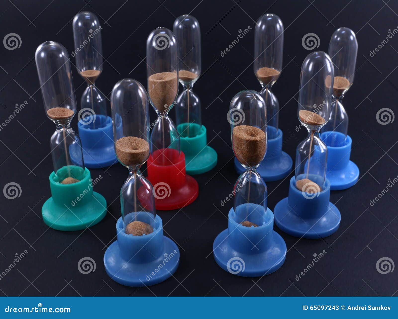 Group Of Hourglasses Of Different Colors In Action Stock Image Image Of Countdown Measurement
