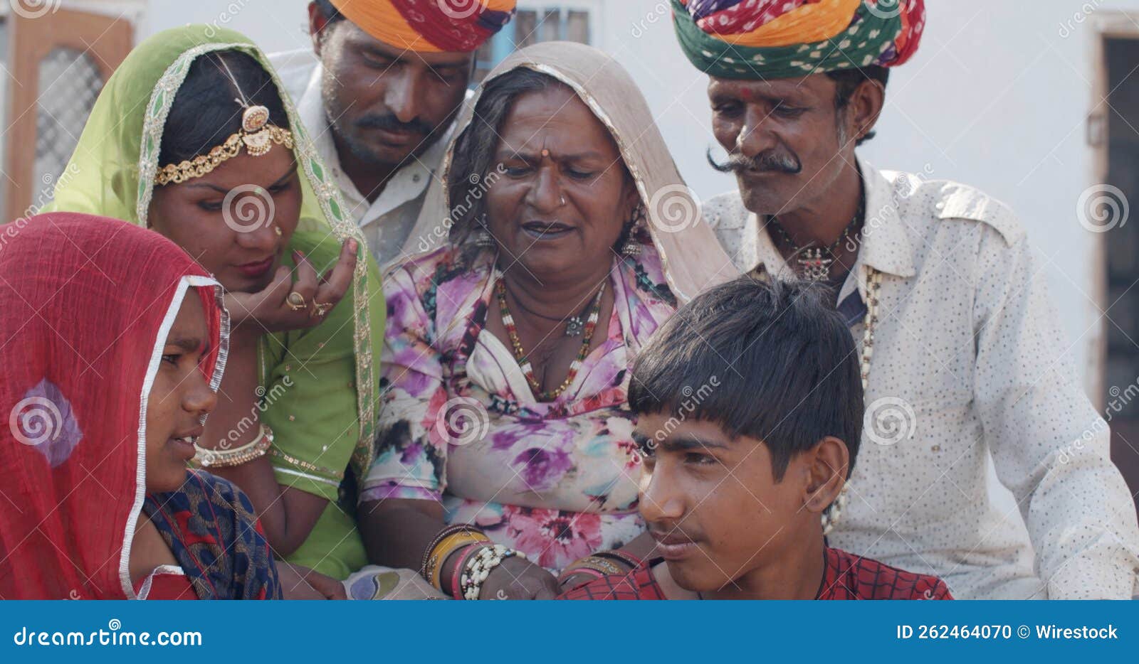 Group of Indian People Having a Conversation Outdoors Stock Photo ...