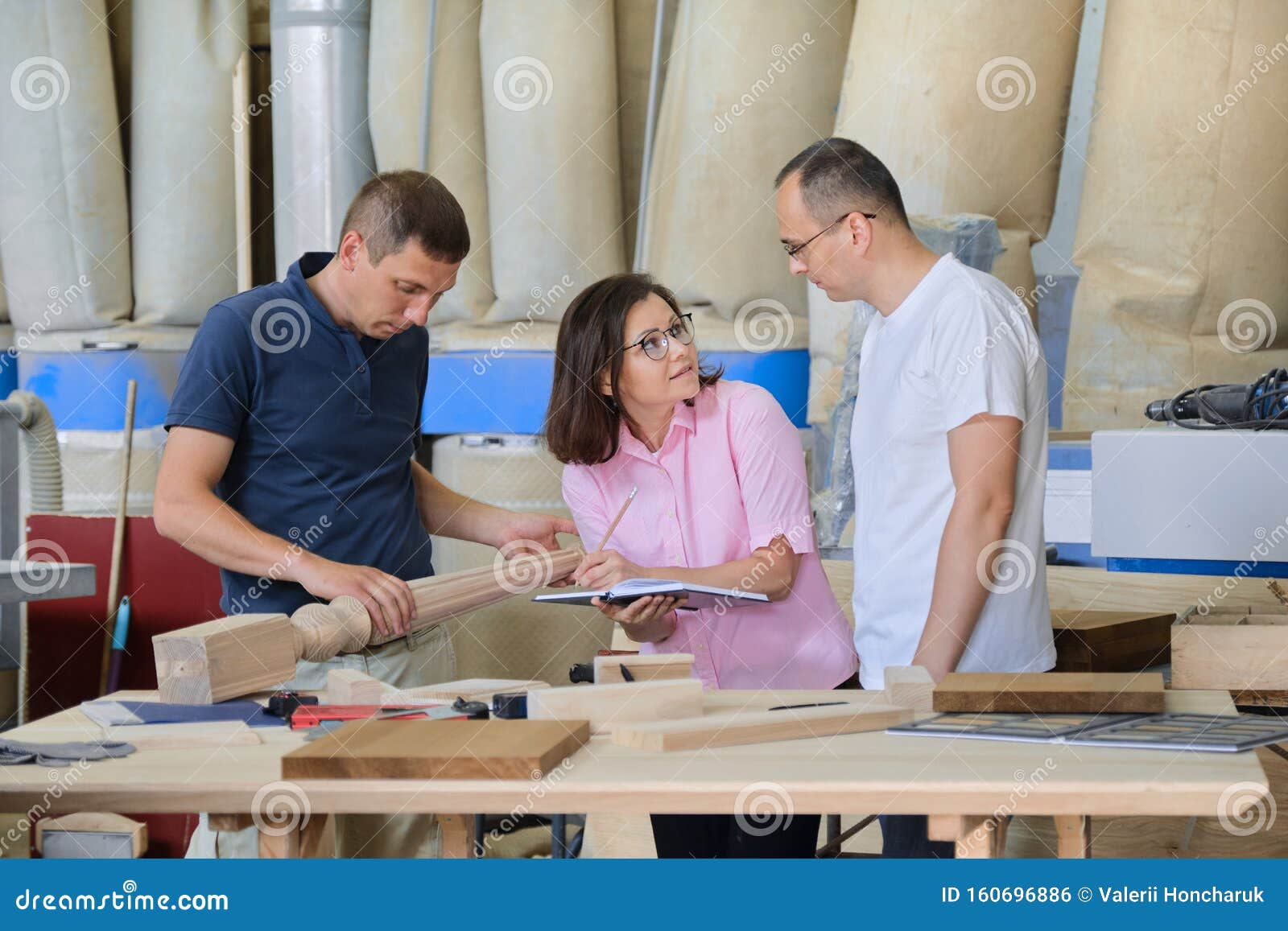 Group of Industrial People Working Together, Teamwork in Carpentry ...