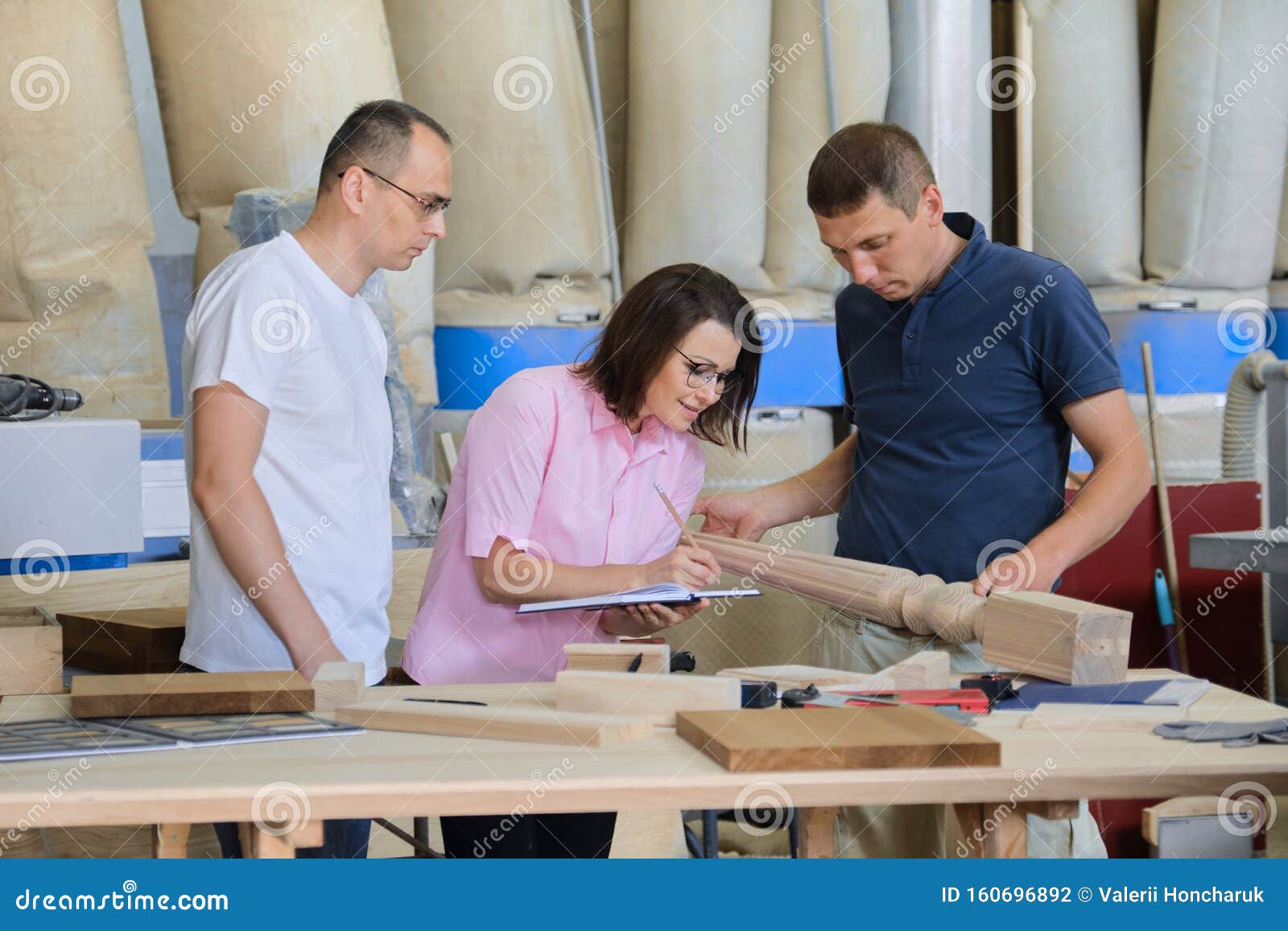 Group of Industrial People Working Together, Teamwork in Carpentry ...