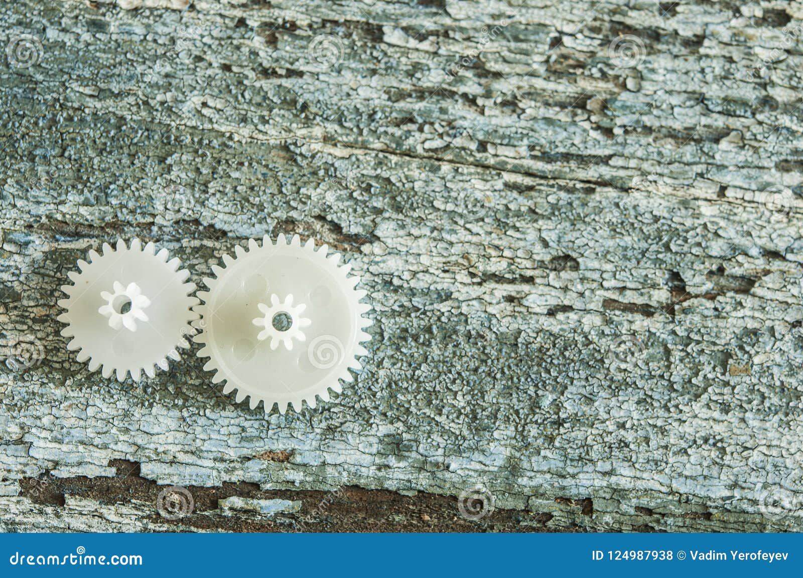 Gear Wheels on a Wooden Background. the Concept of Creative, Log Stock ...