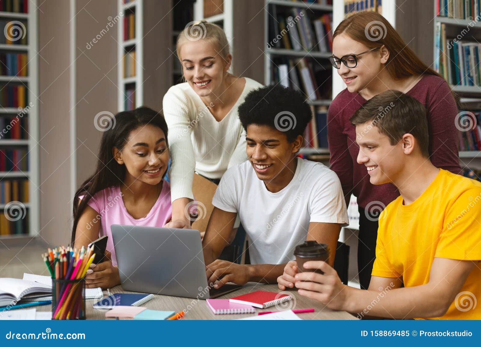 Group of International Classmates Checking on New Project Stock Image ...