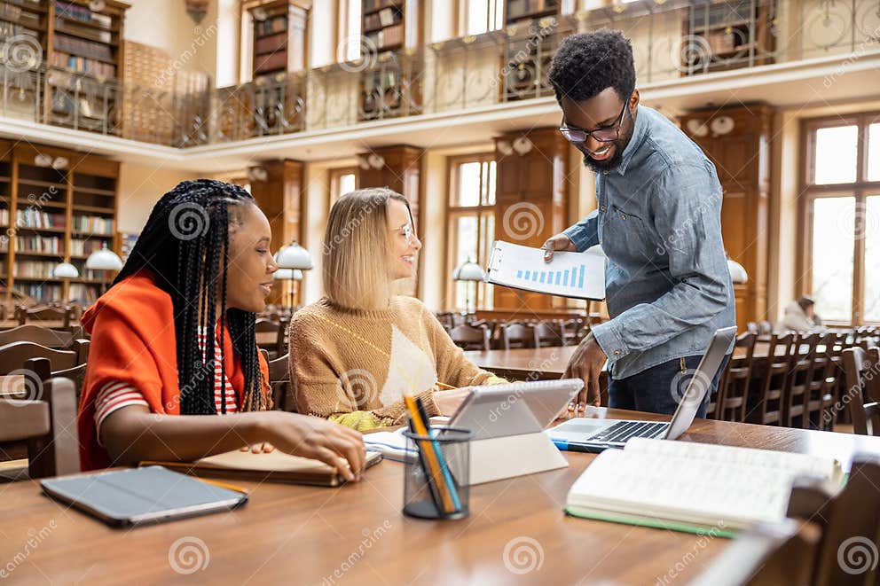Group of International Students Working Together in the Library Stock ...