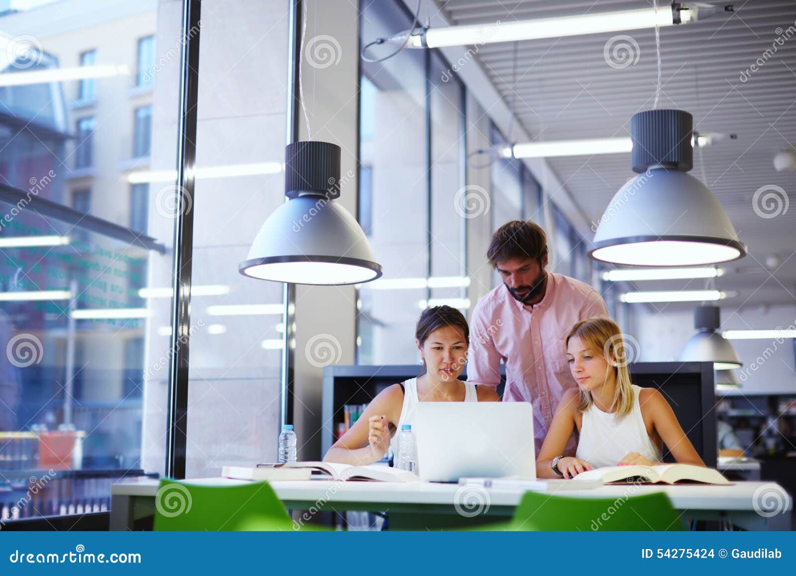 Group of International University Students Learning in Library Stock ...
