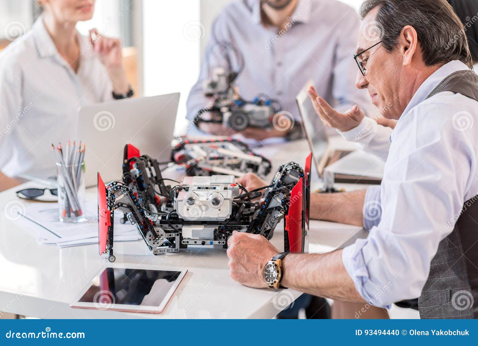 Group of Inventors Constructing Devices in Office Stock Photo - Image ...