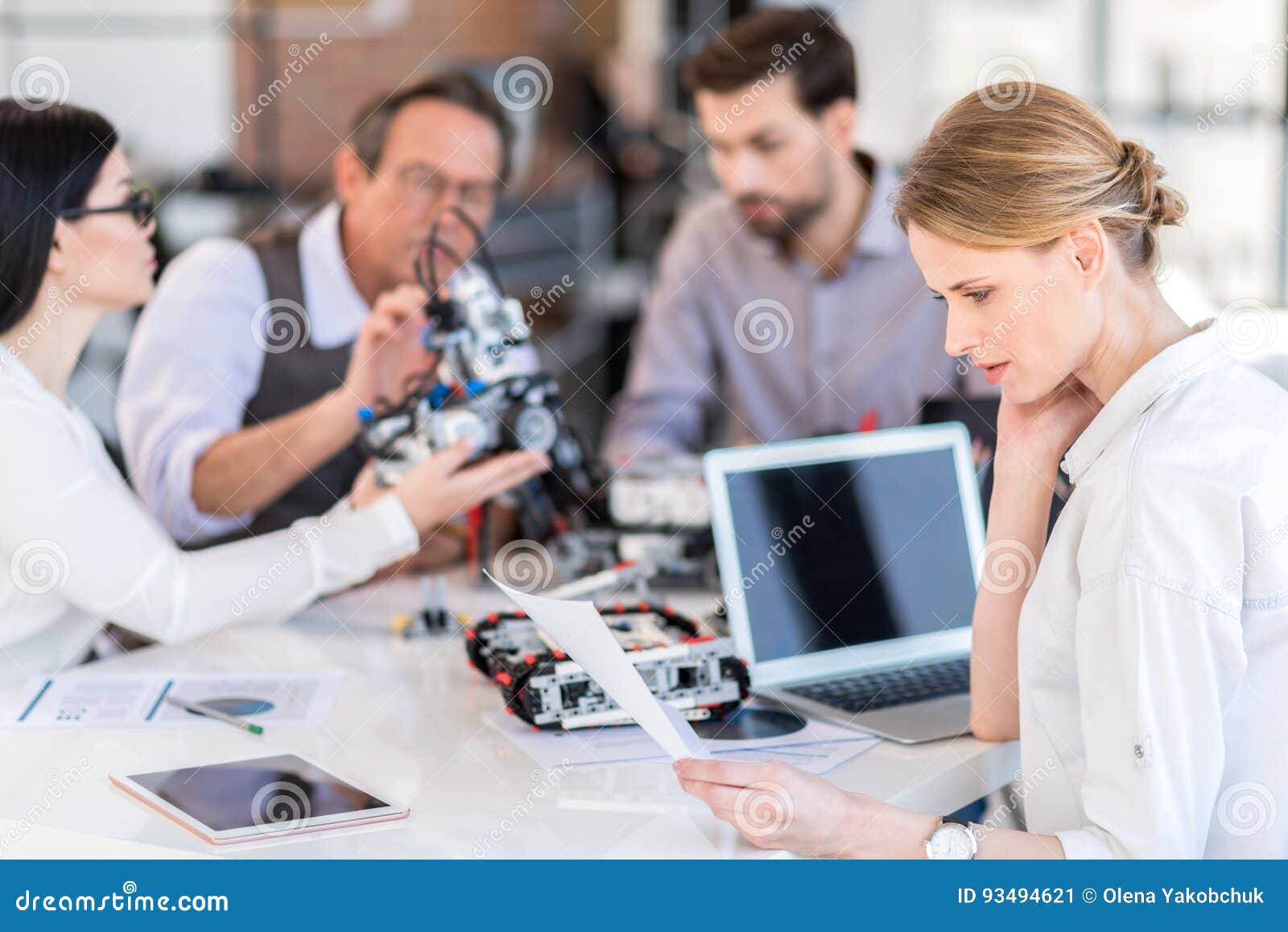 Group of Inventors Testing Device in Office Stock Image - Image of ...