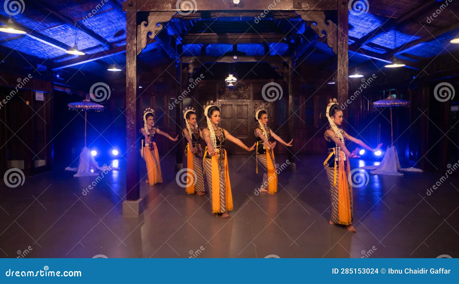 A Group of Javanese Dancers are Dancing a Traditional Dance in an Old ...