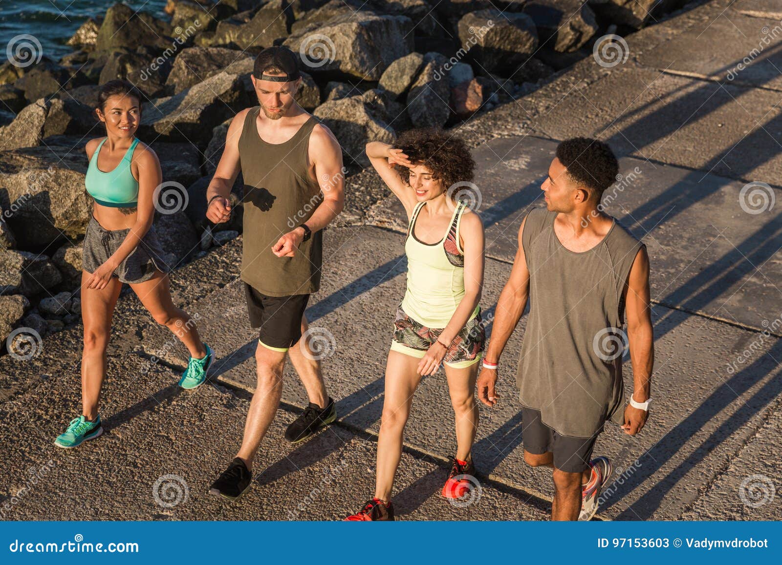 Group of Joggers Talking and Smiling during Workout Stock Image - Image ...