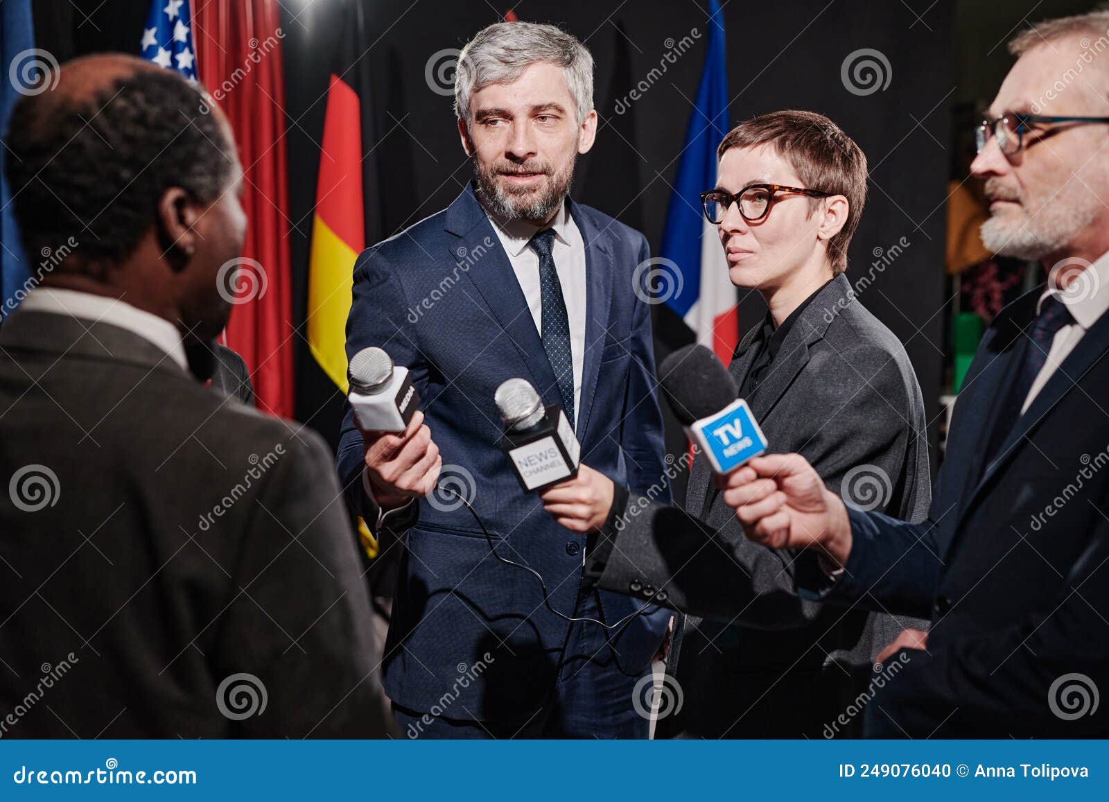 Group of Journalists Taking an Interview Stock Photo - Image of flag ...