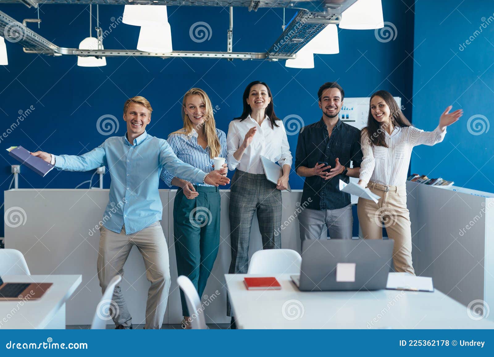 Group of Joyful Young People Welcoming with Open Arms Stock Photo ...