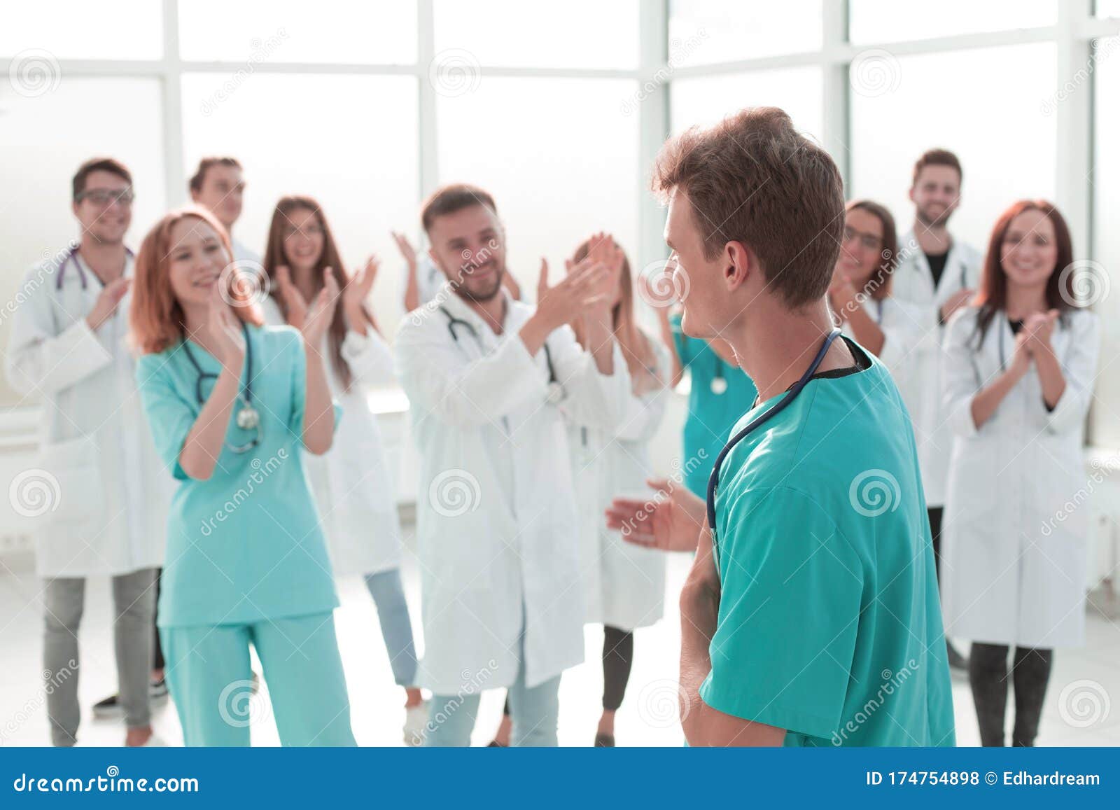 Group of Jubilant Young People Looking Forward Stock Photo - Image of ...
