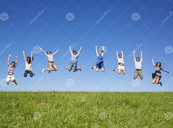 Group jumping stock image. Image of friendship, blue - 11009245