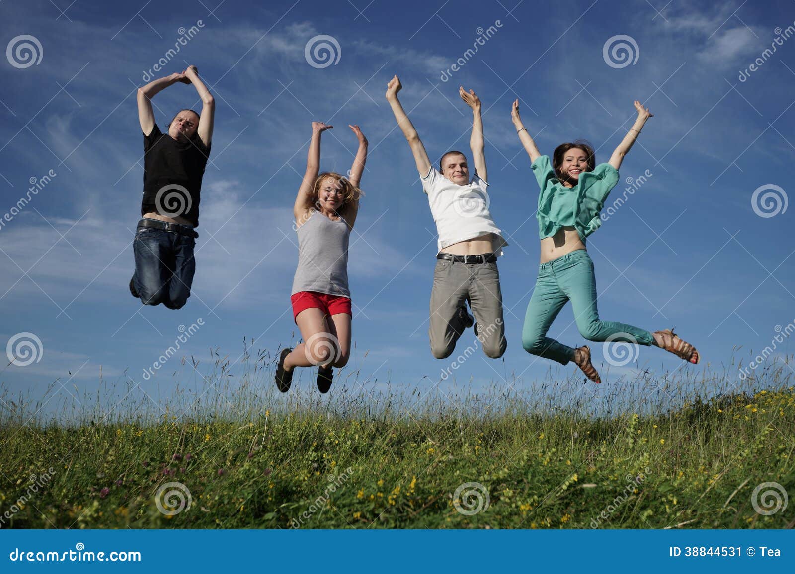 Group of Jumping People on Grean Meadow Stock Image - Image of exercise ...