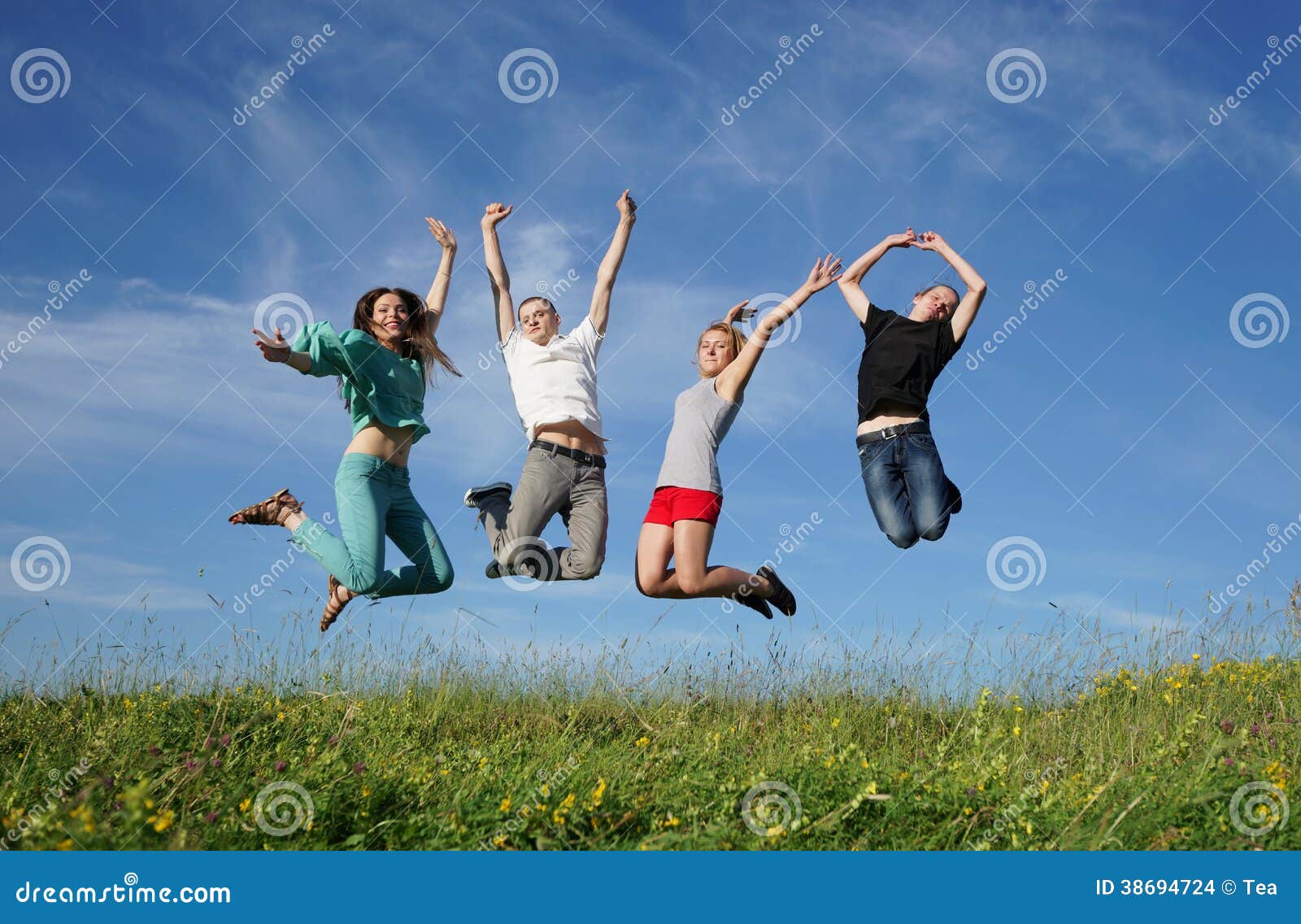 Group of jumping people stock photo. Image of grass, blue - 38694724